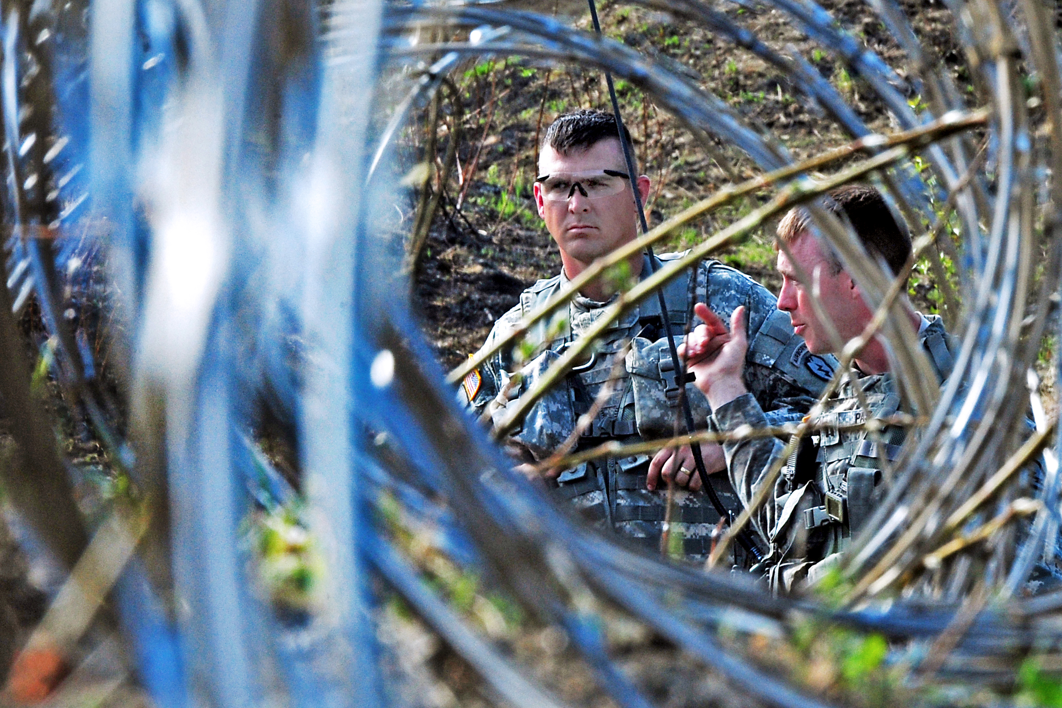 Army Sgt. 1st Class Cory Birdsong, left, and Army Capt. Brandon Pasko ...