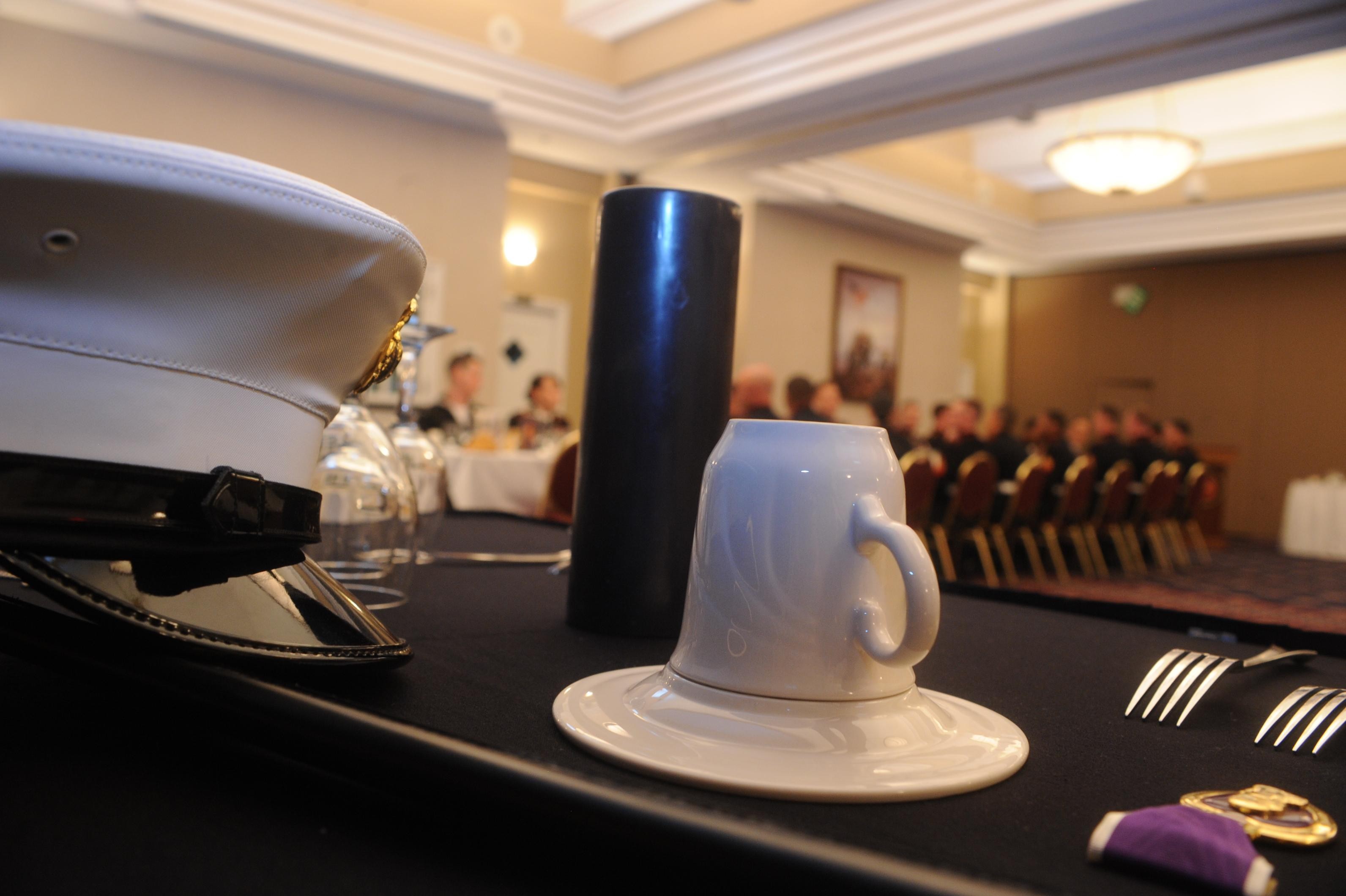Behind the Fallen Comrades Table, Headquarters Company Marines dine ...
