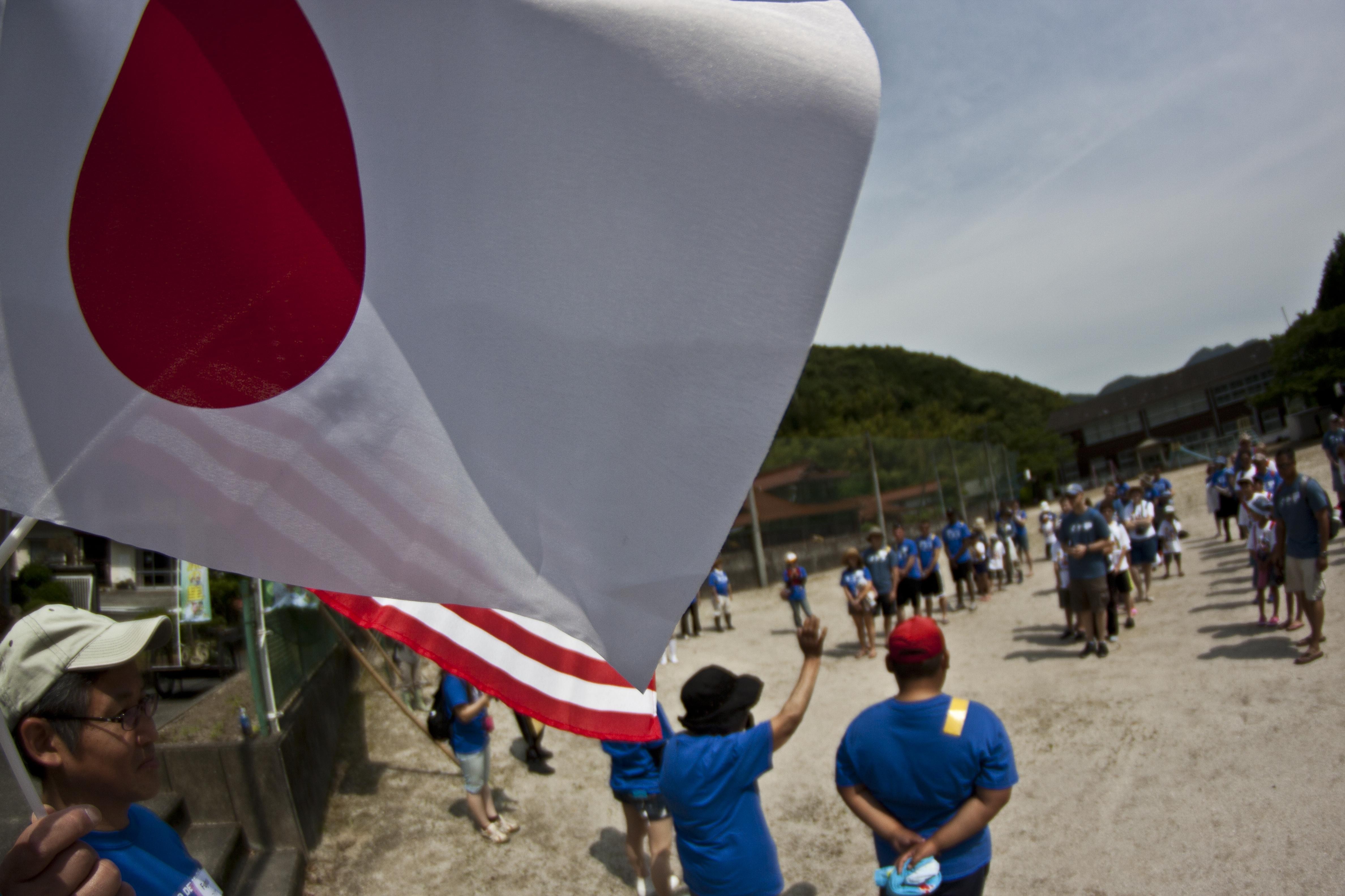 Station residents participant in rice-planting event
