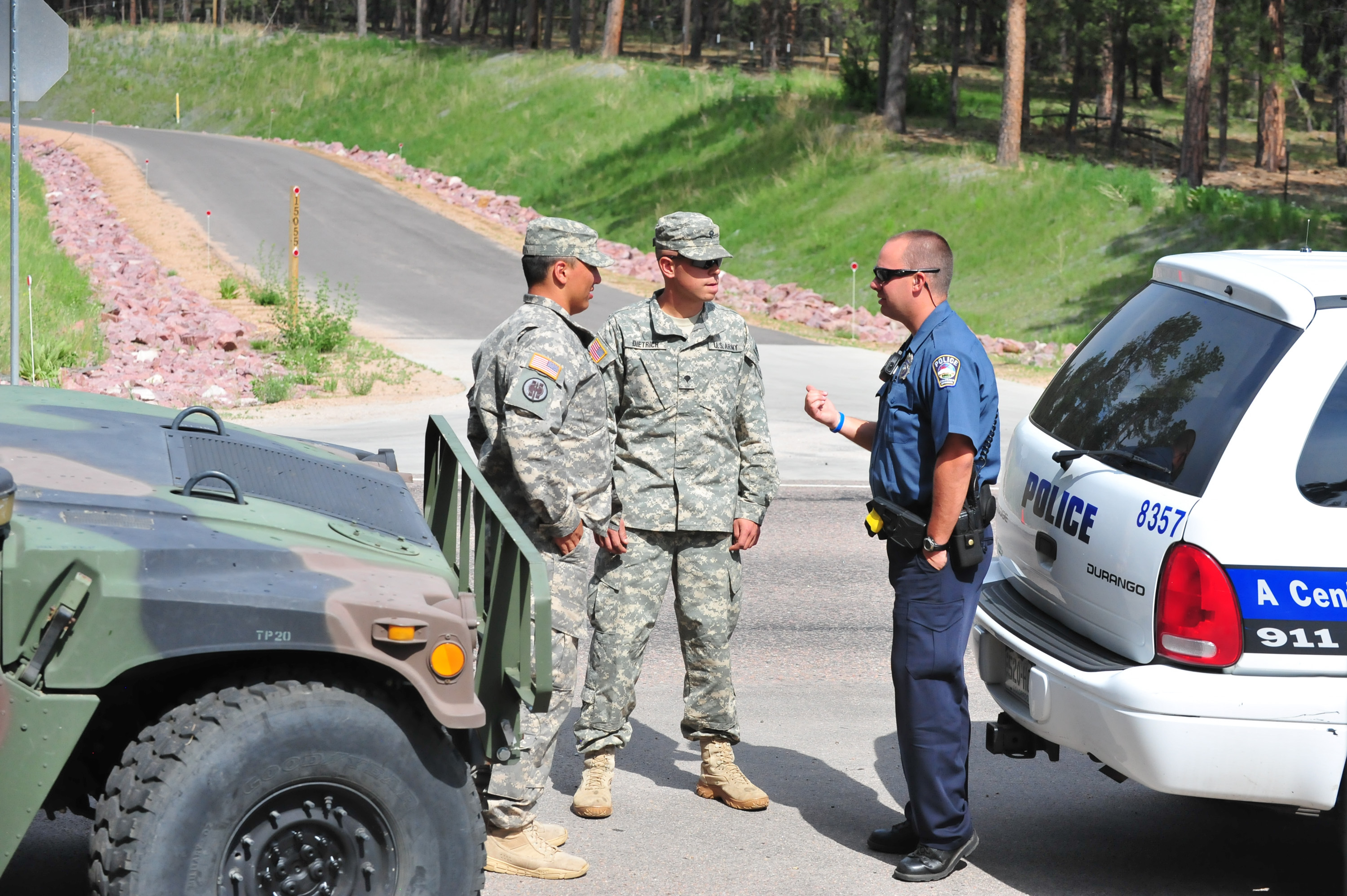 Colorado Army National Guard Sgt. Daniel Evanson and Spc. Mark Goya ...