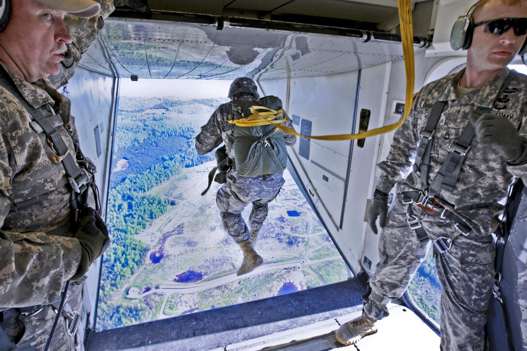 Army 1st Sgt. Donald Teter, left, and Army Sgt. 1st Class Garret ...