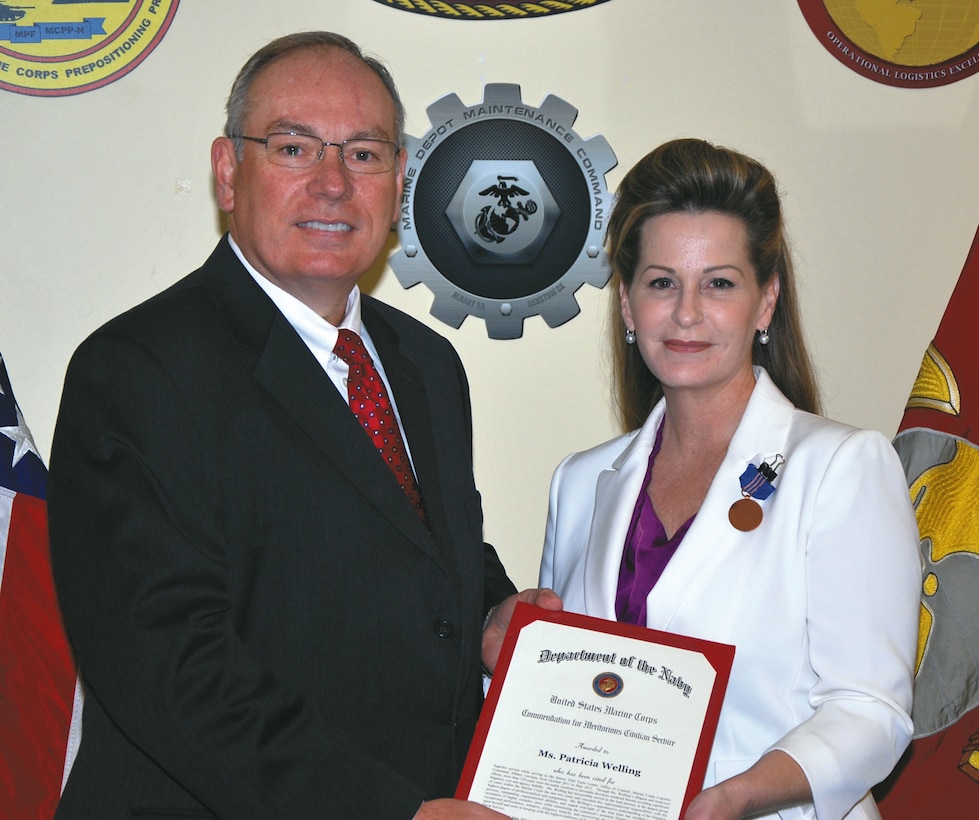 Civilian-Marine receives meritorious service award
