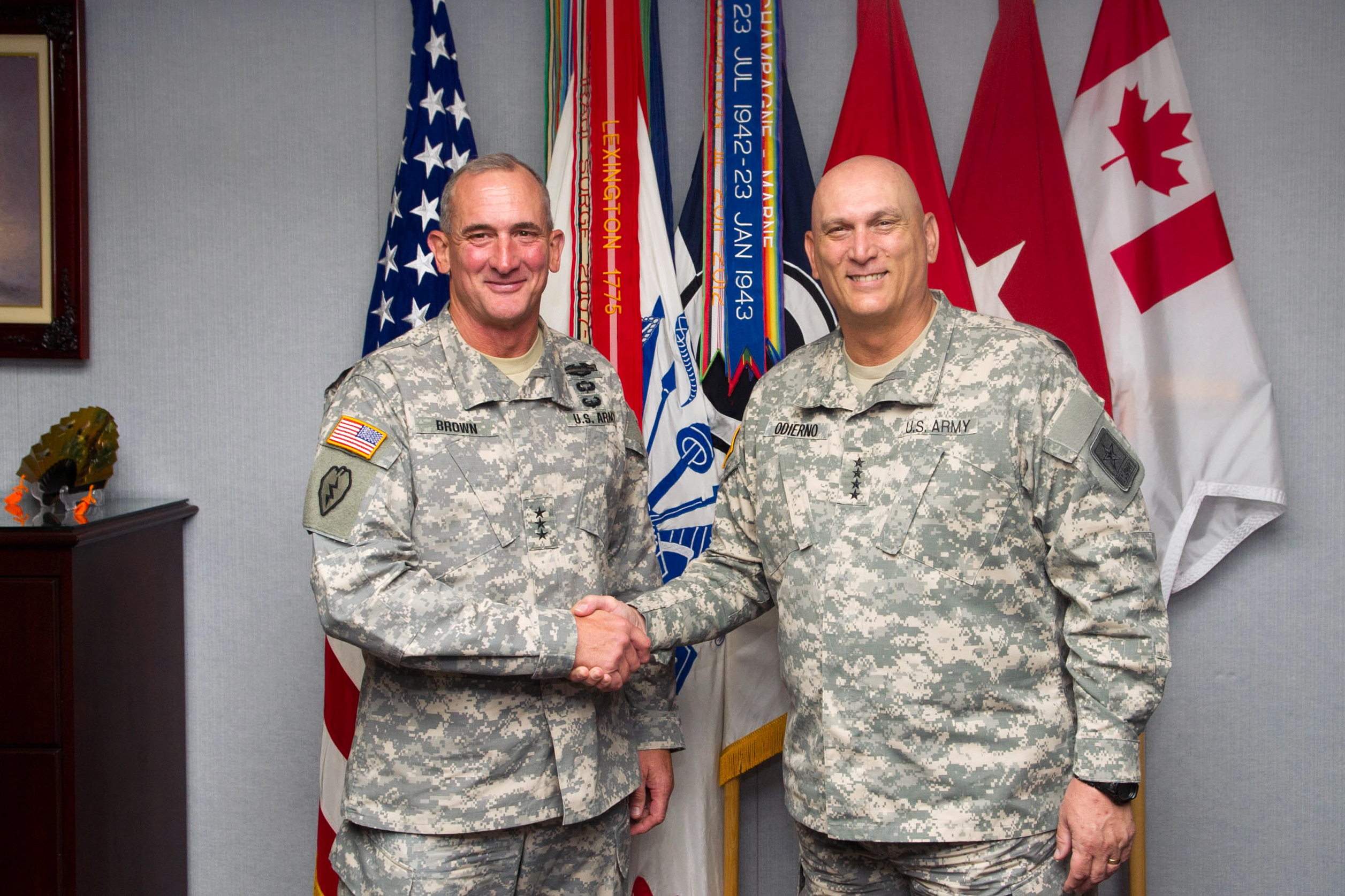 Army Chief of Staff Gen. Ray Odierno, right, poses for a photograph ...