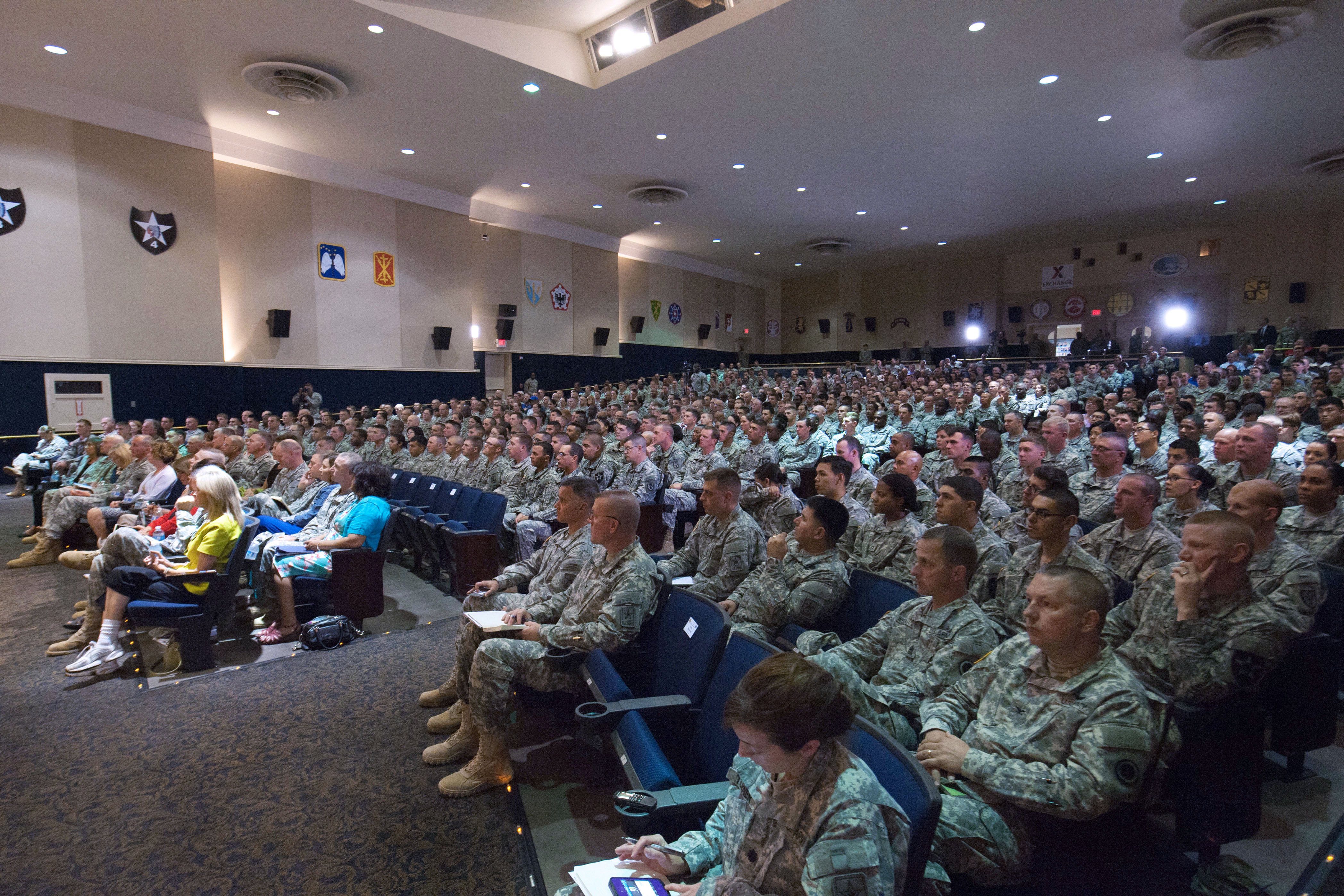 Soldiers, family members and Army Civilians listen to Army Chief of ...