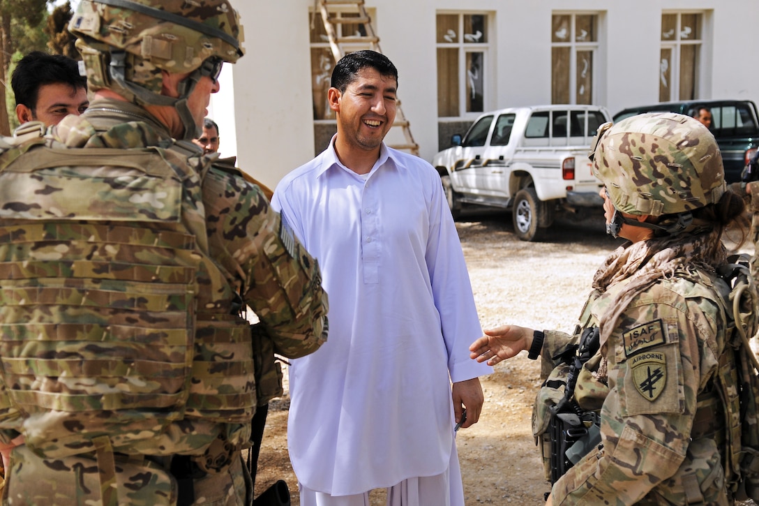 U.S. Army Cpt. Jennifer Leathers, right, and U.S. Navy Cmdr. Jeremy ...