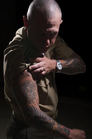 why do marines get tattoos