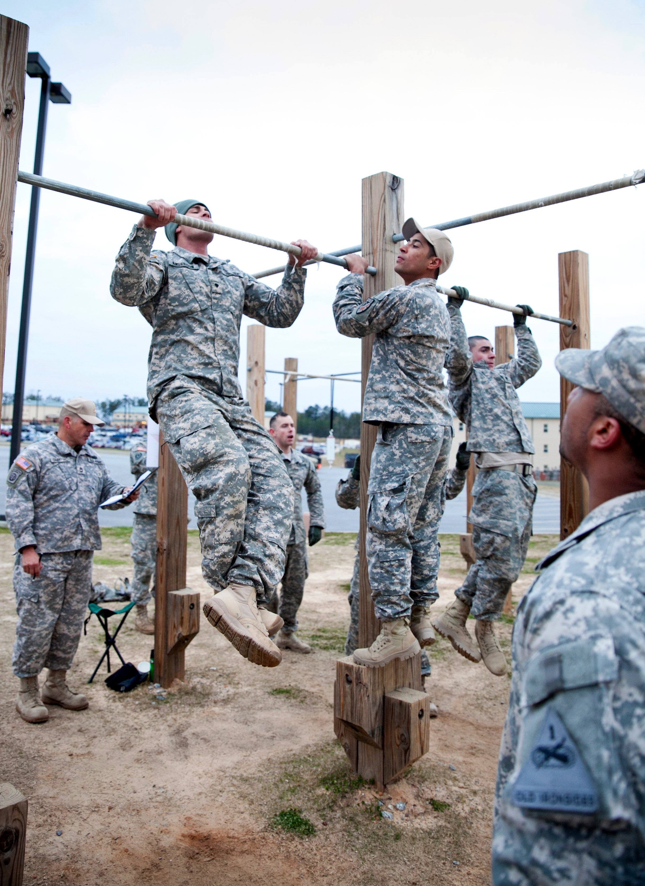 Soldiers perform chin-ups during the first Gainey Cup scout competition ...