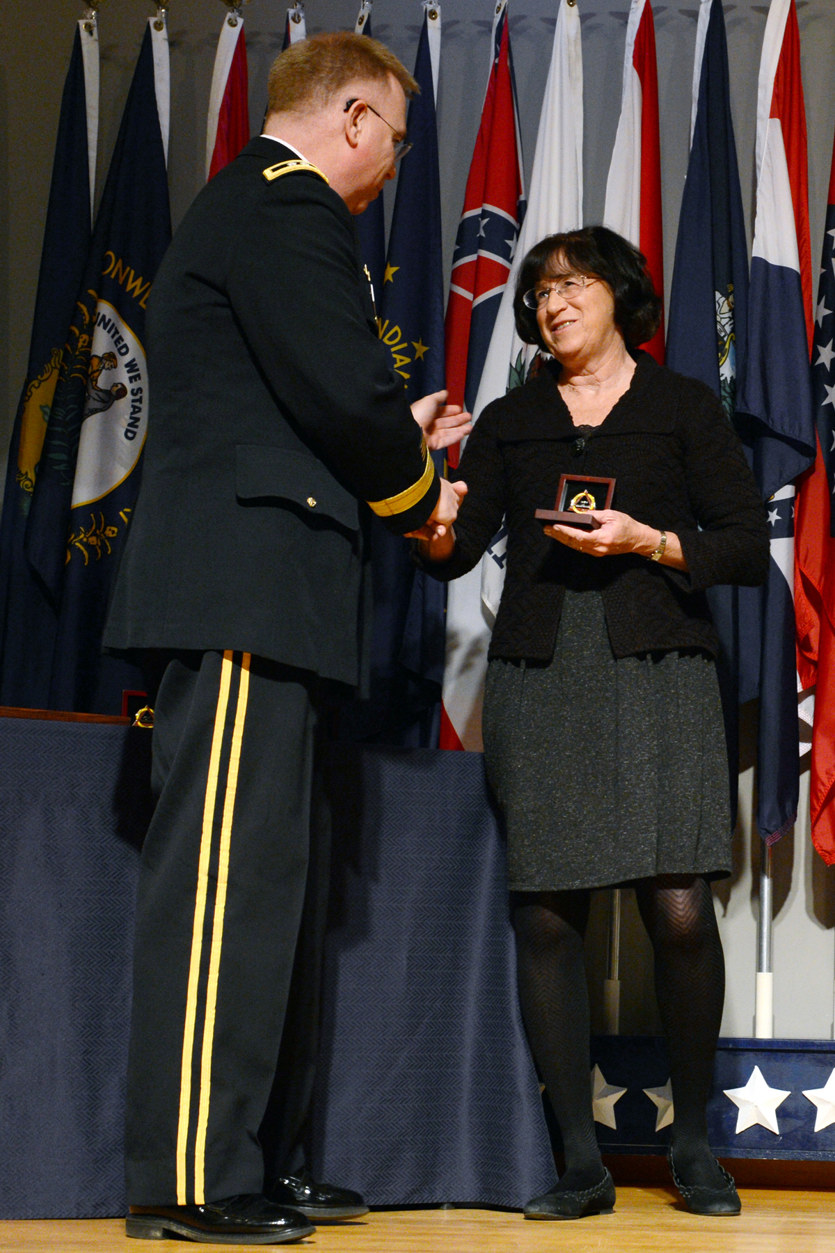 Army Chief of Chaplains Major Gen. Donald L. Rutherford, left, presents ...