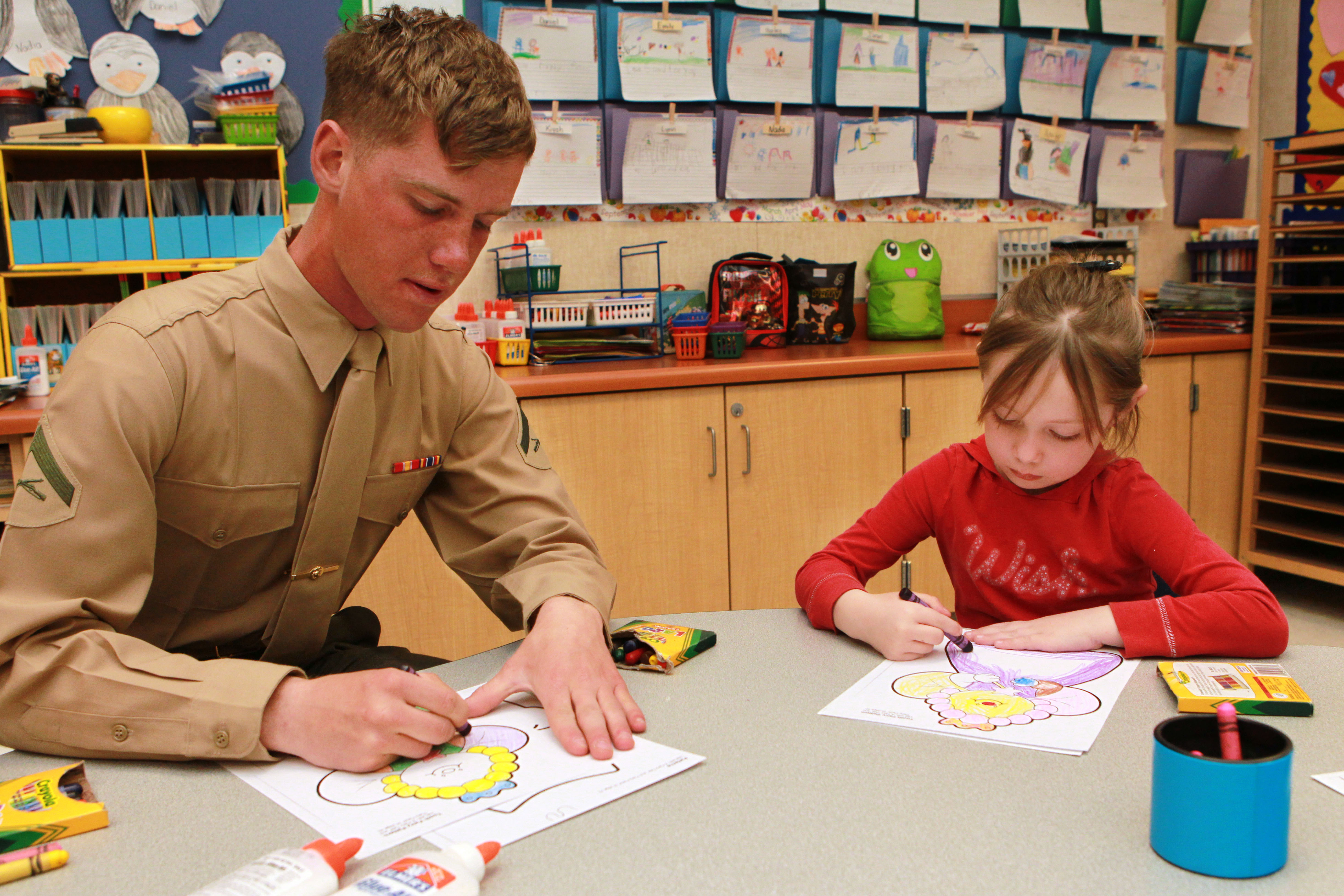 Marines from Combat Center open books, read to kids