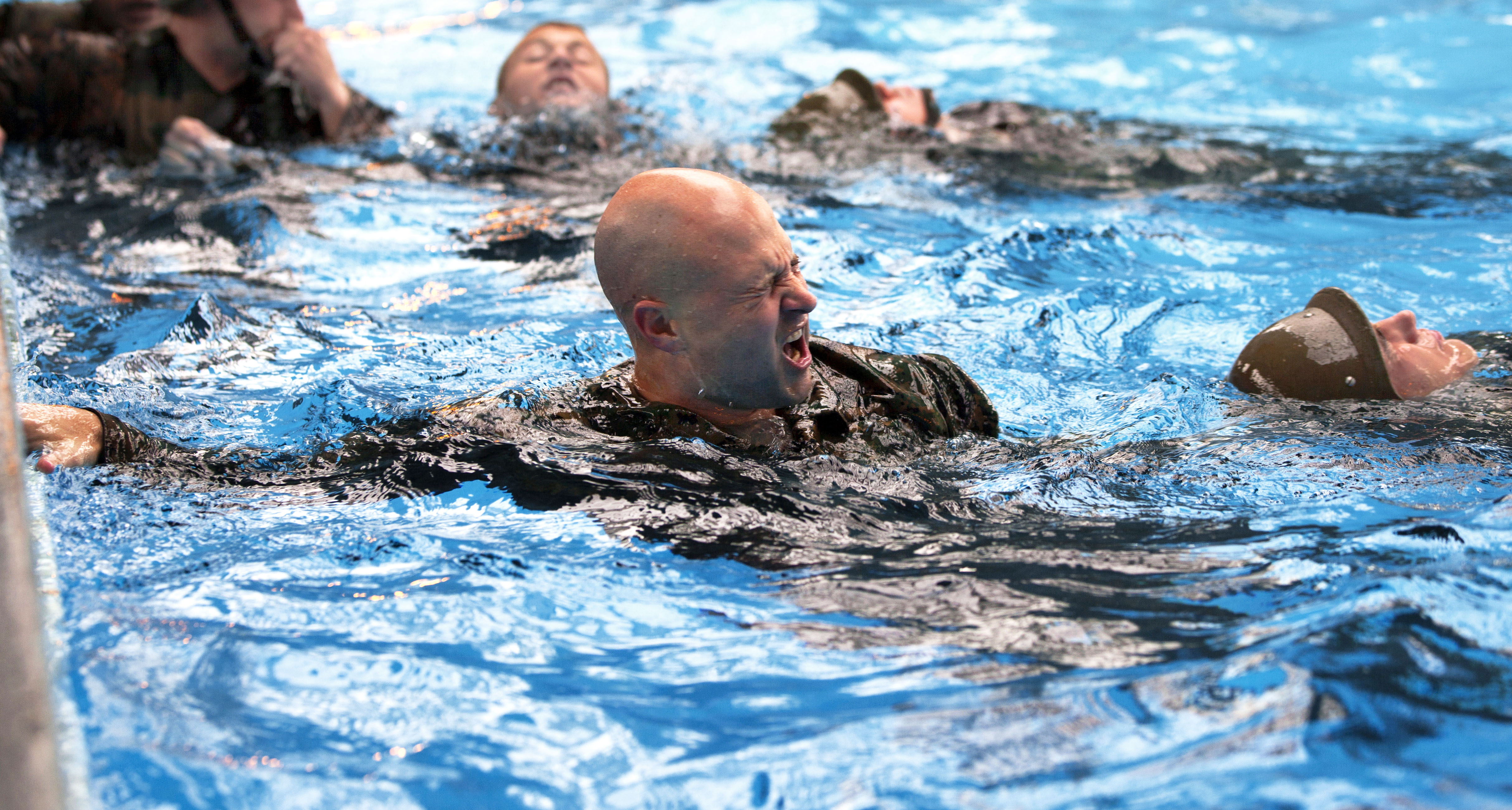 Marine Corps Master Sgt. Robert Moates completes a rescue drill during ...