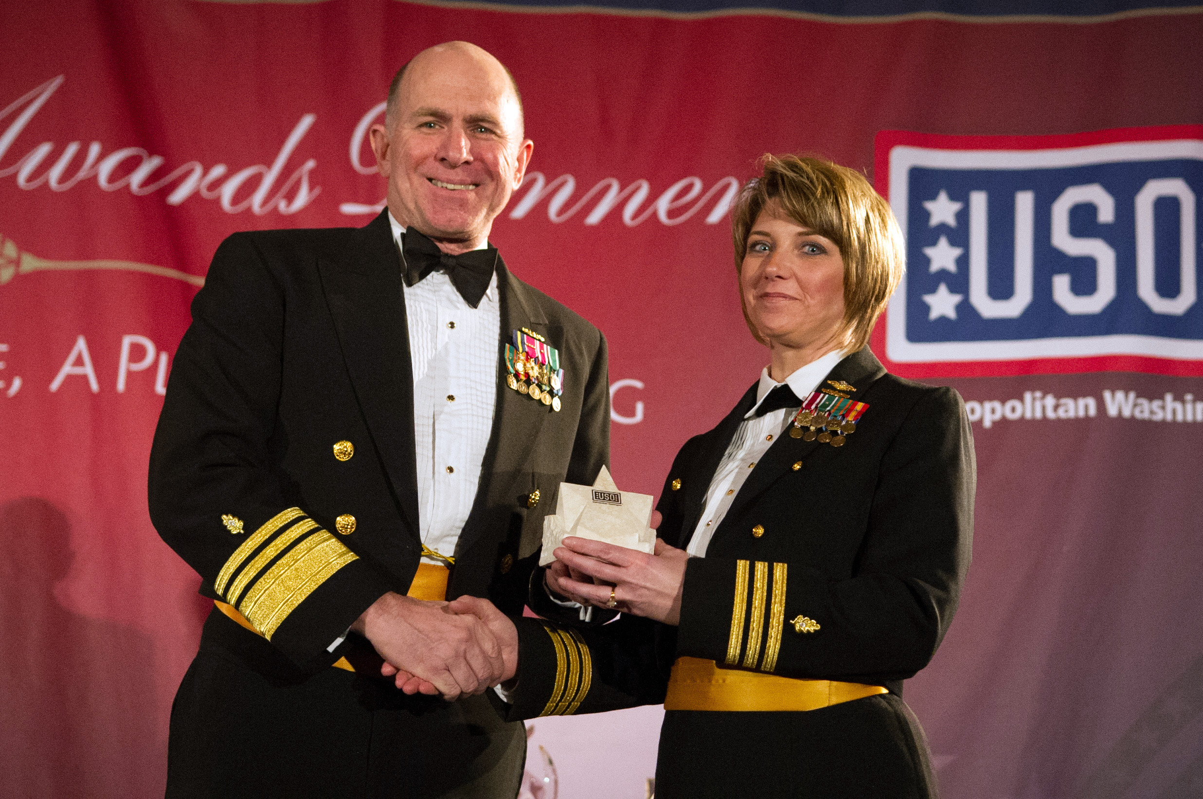 Navy Rear Adm. Colin Chinn, left, chief of the Navy Medical Corps ...