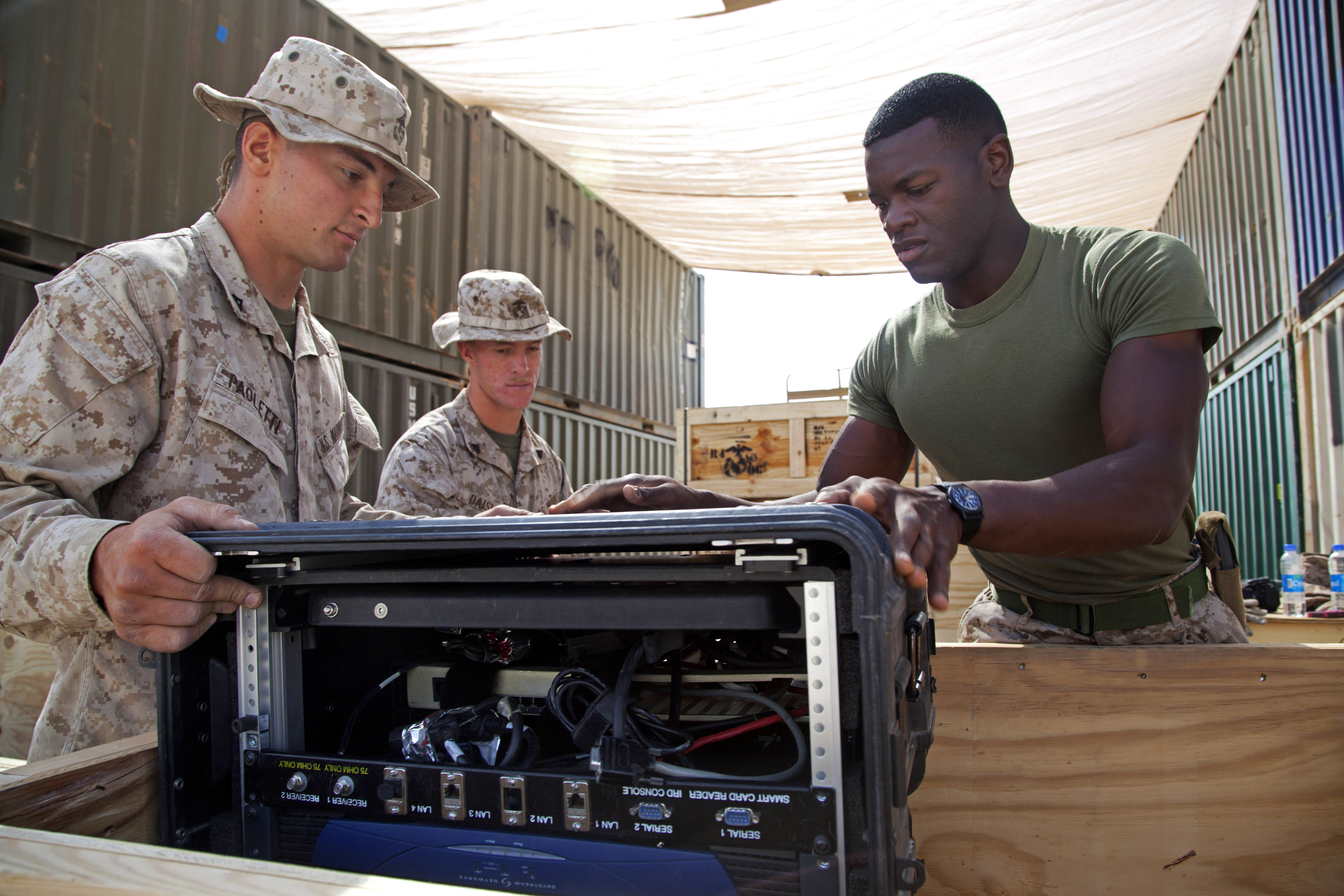 U.S. Marine Corps Lance Cpls. Dominic Paoletti, left, and Corey Brown ...
