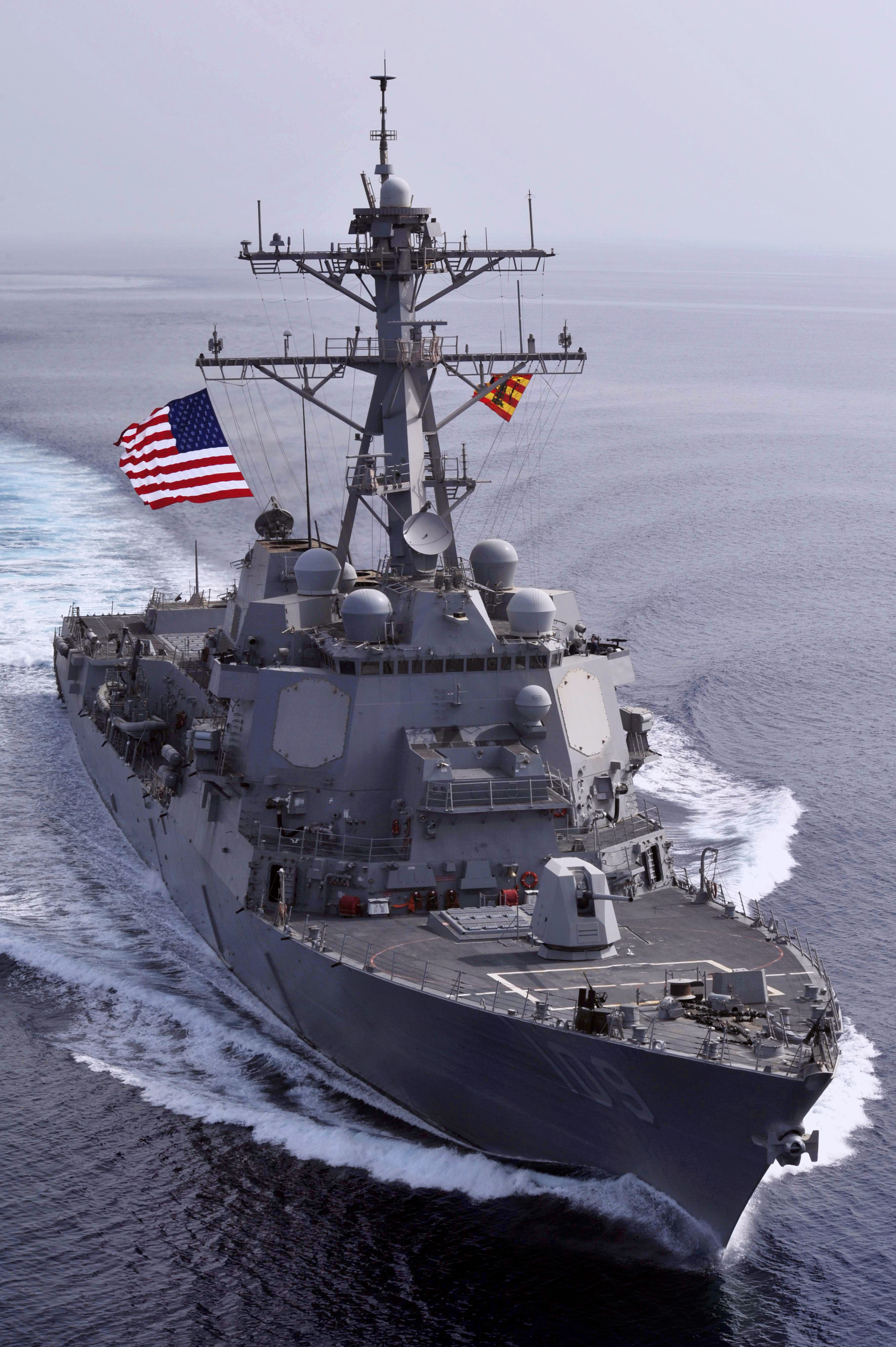 The guided-missile destroyer USS Jason Dunham transits in the U.S. 5th ...