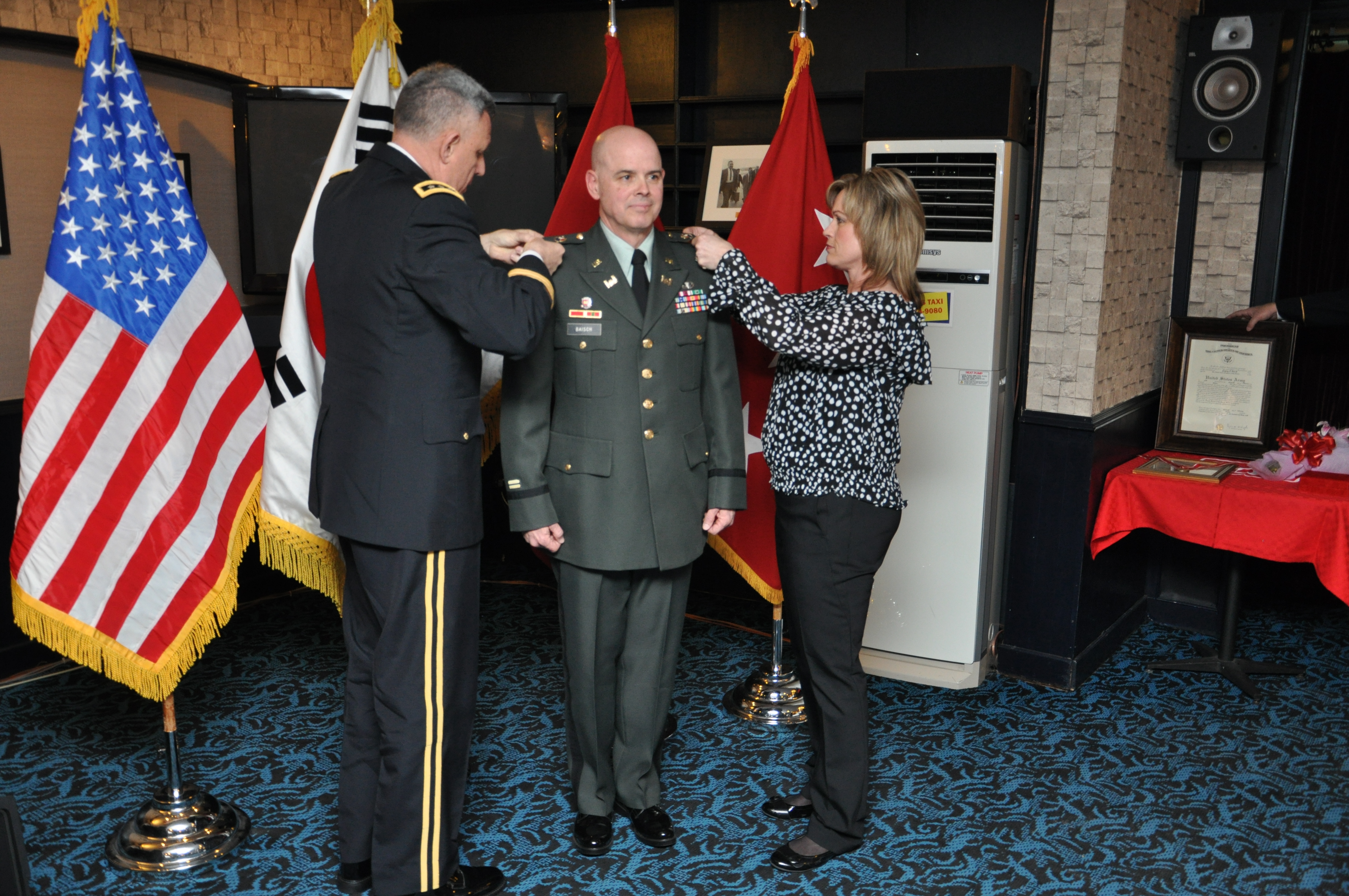Col. Baisch's promotion and awarding ceremony