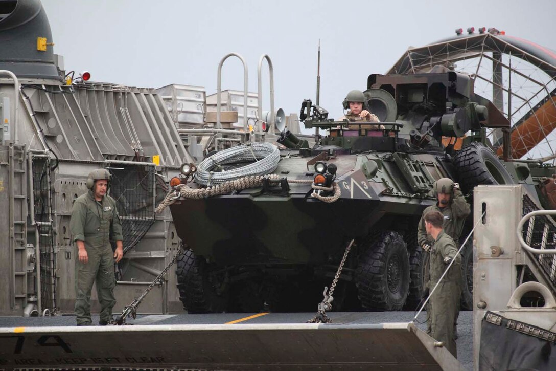 Light armored reconnaissance Marines unite with Navy for amphibious landing