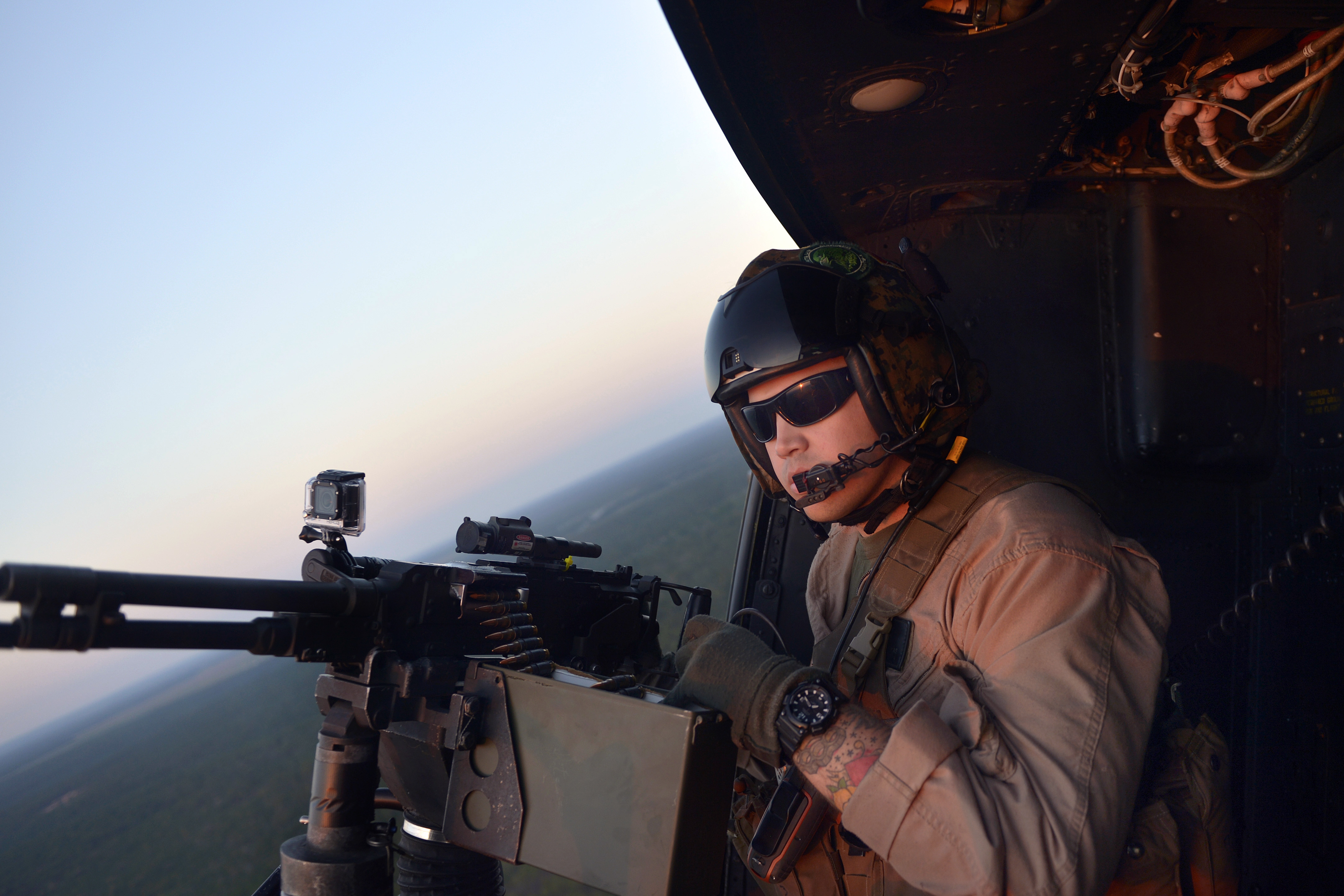 A Marine Corps UH-1N Huey crew chief assigned to the 773rd Marine Light ...
