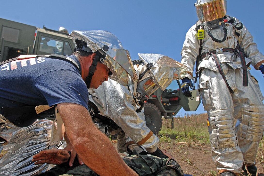 Soldiers and a member of the Puerto Rico Fire Department hone their ...