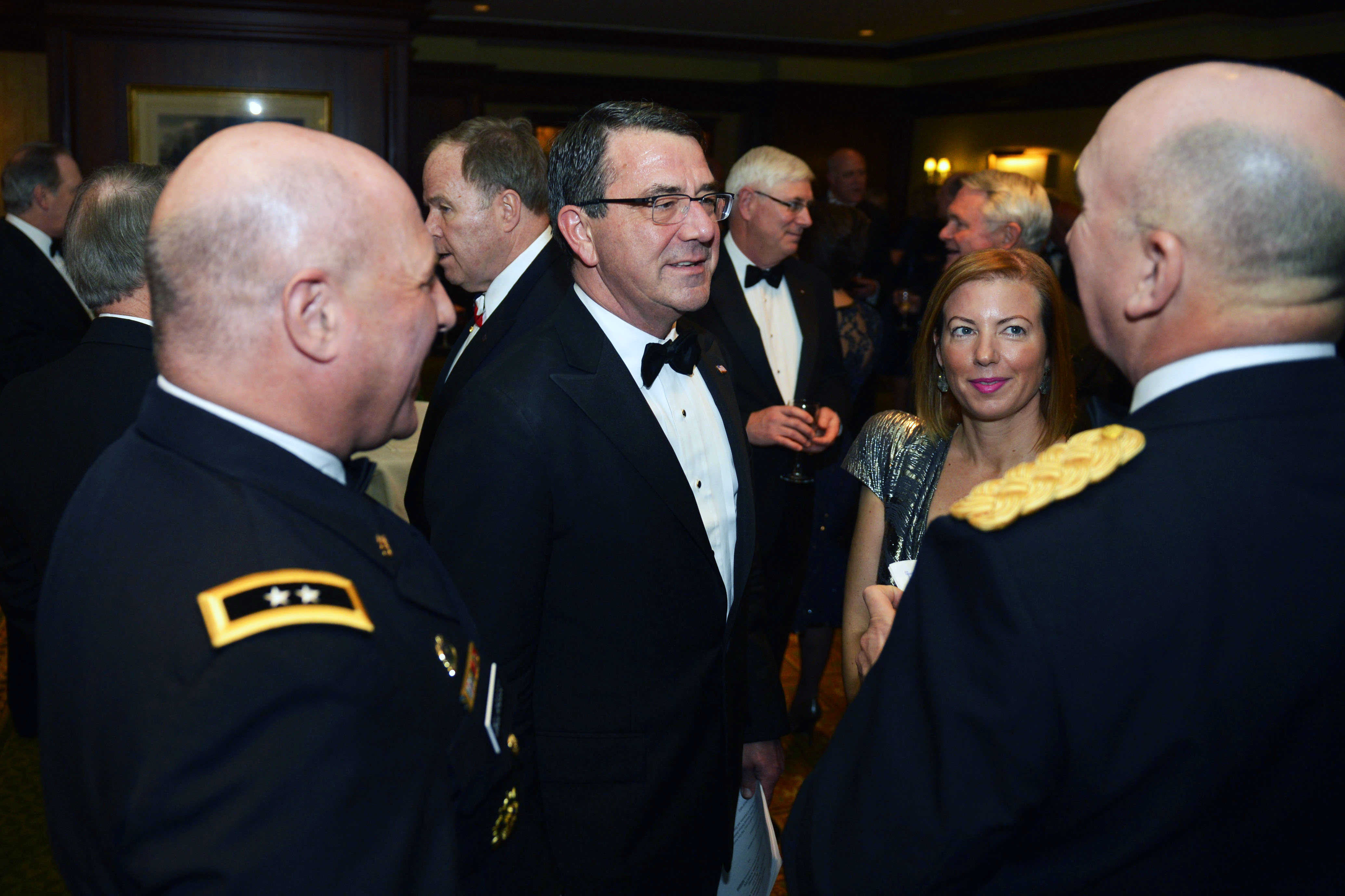 Deputy Defense Secretary Ash Carter and his wife, Stephanie, visit with ...