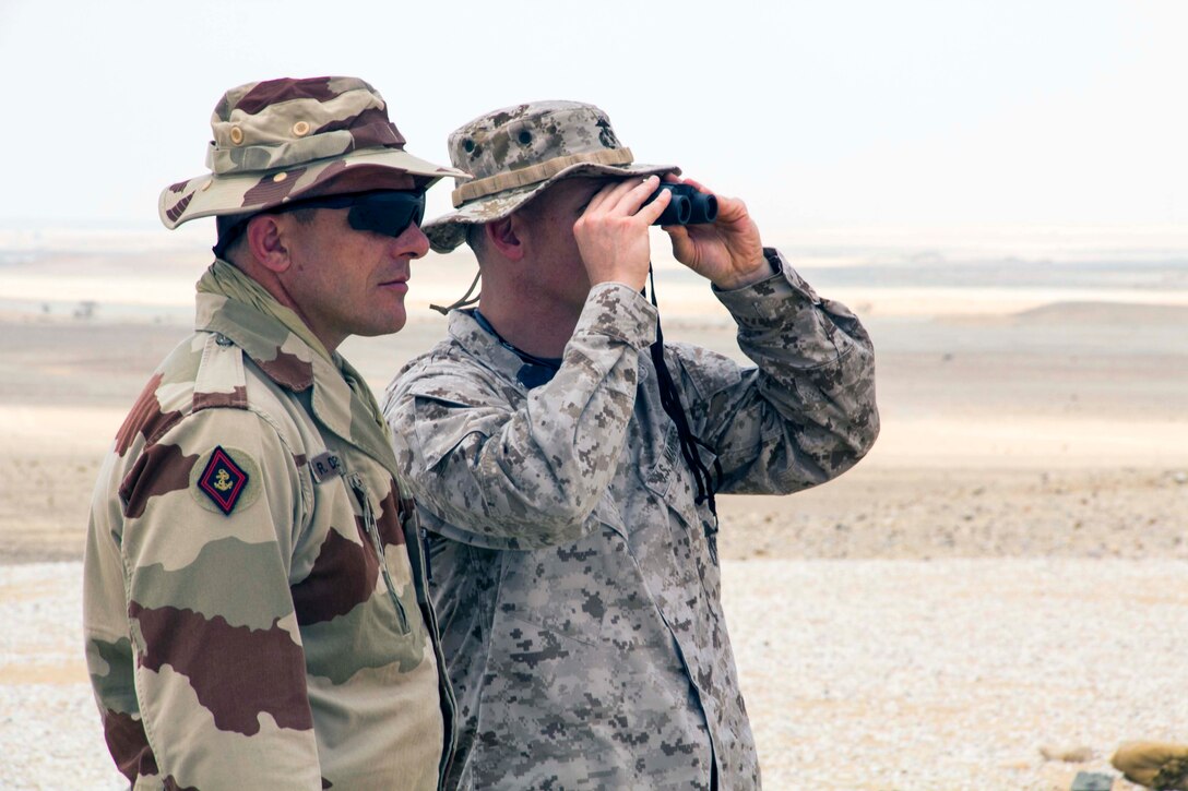 U.S. Marine Corps. Lt. Col. Kevin Collins, right, and Lt. Col. Rene ...