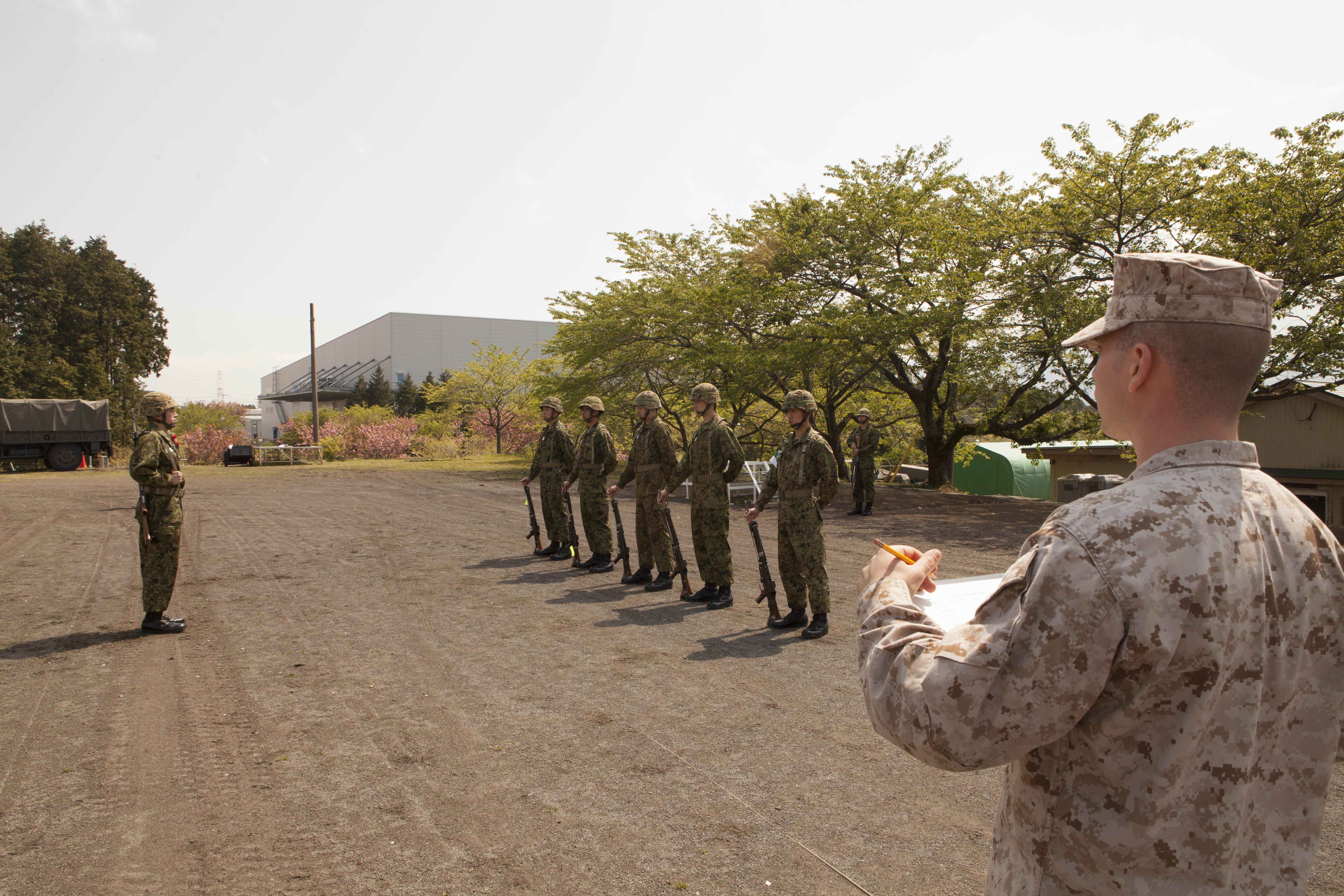Marines assist JSDF members during drill competition