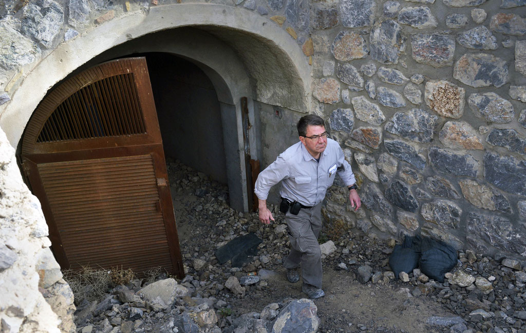 U.S. Deputy Defense Secretary Ash Carter departs the tunnels that once ...
