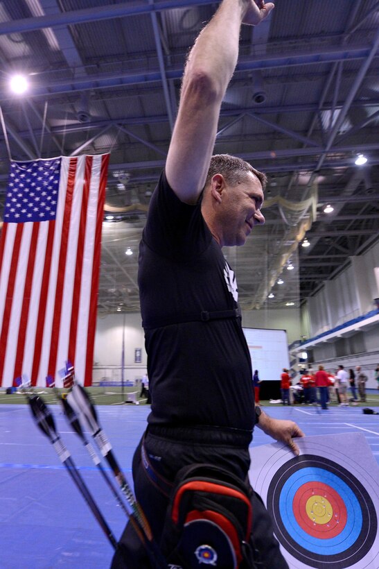 Army Staff Sgt. Edward Patton reacts to winning the gold medal in the ...