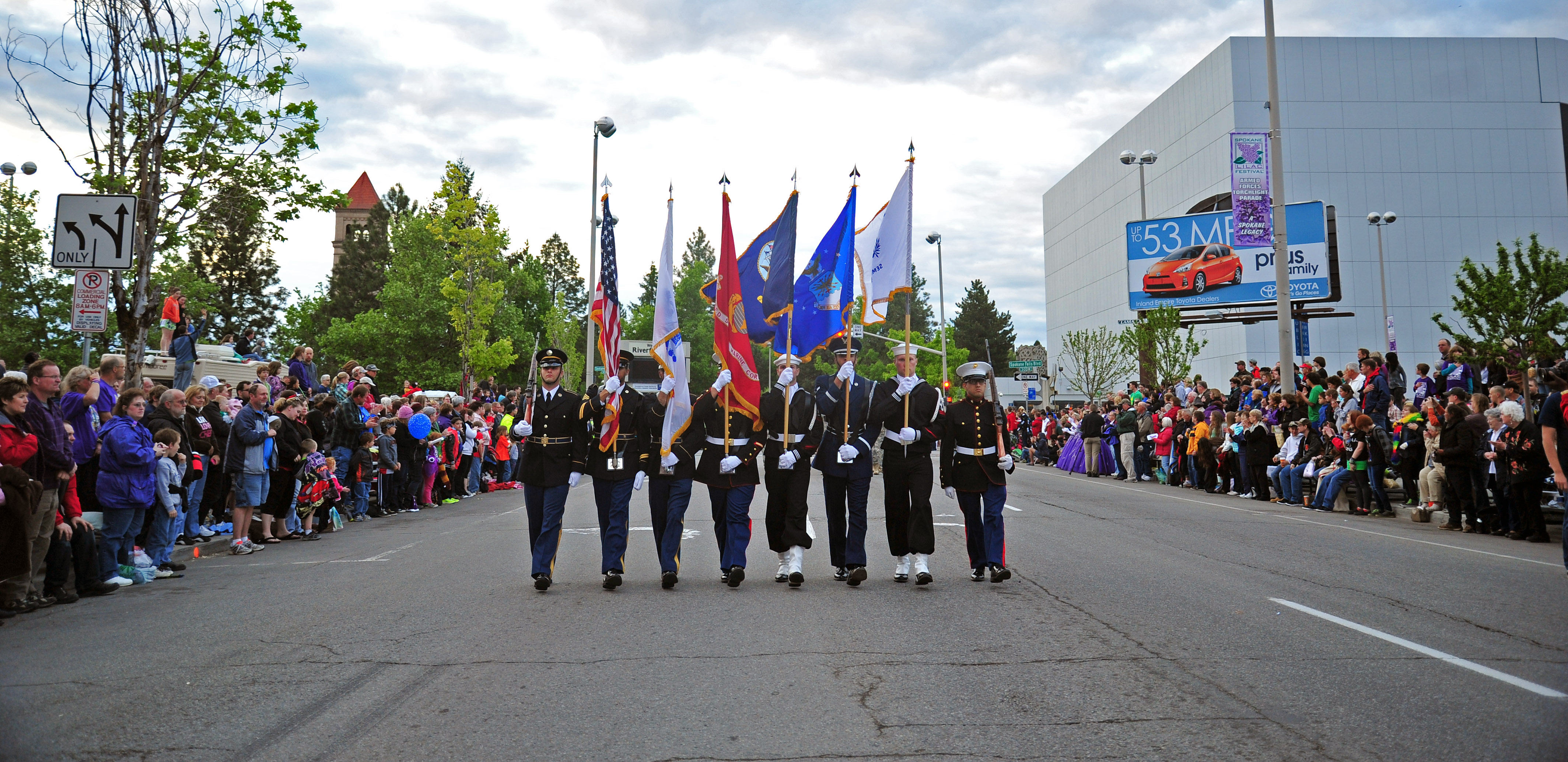 Airmen part of largest 'torchlight' parade to honor Armed Forces Day ...