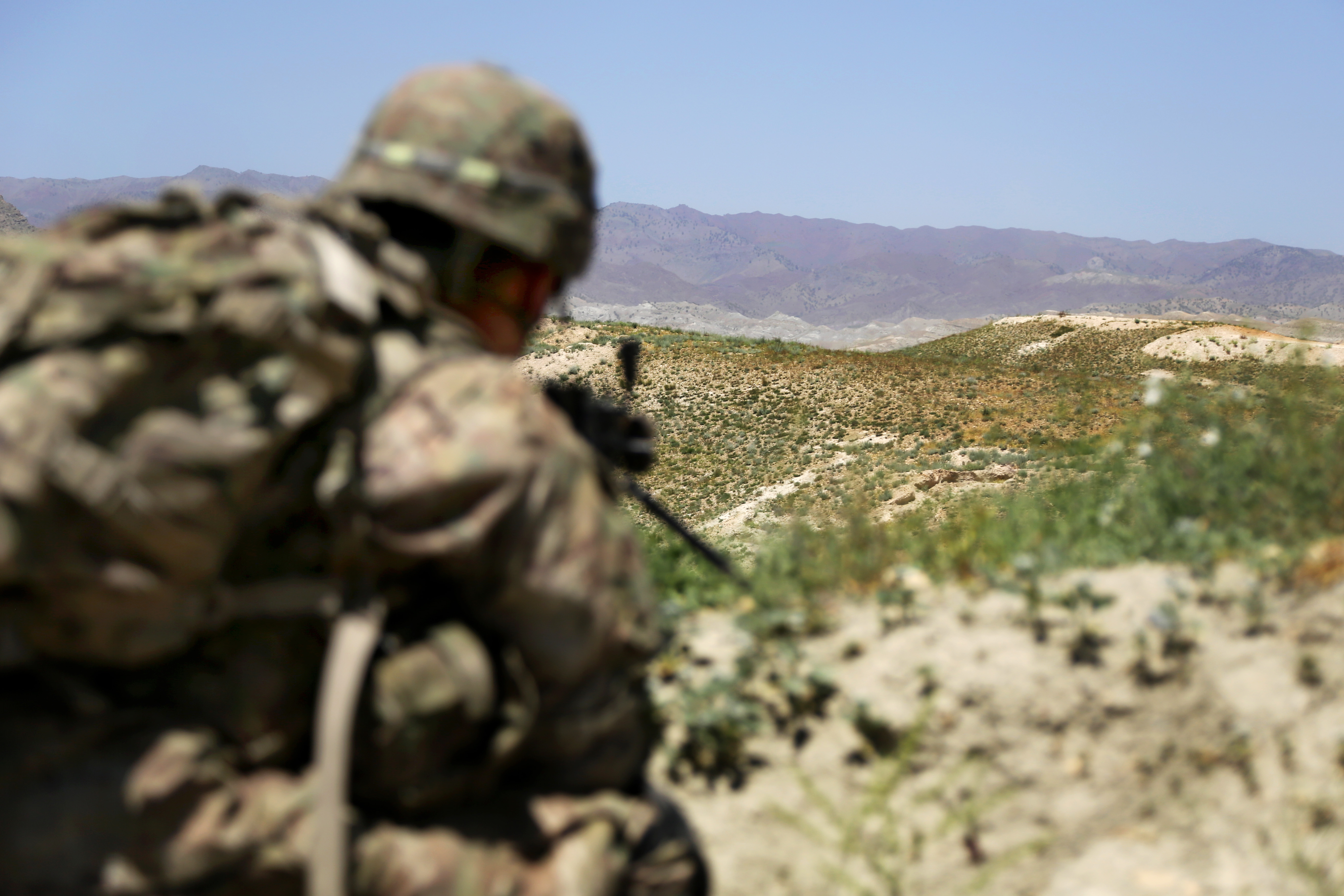 U.S. Army Spc. Jose Escobar provides security in the Hesarak village of ...