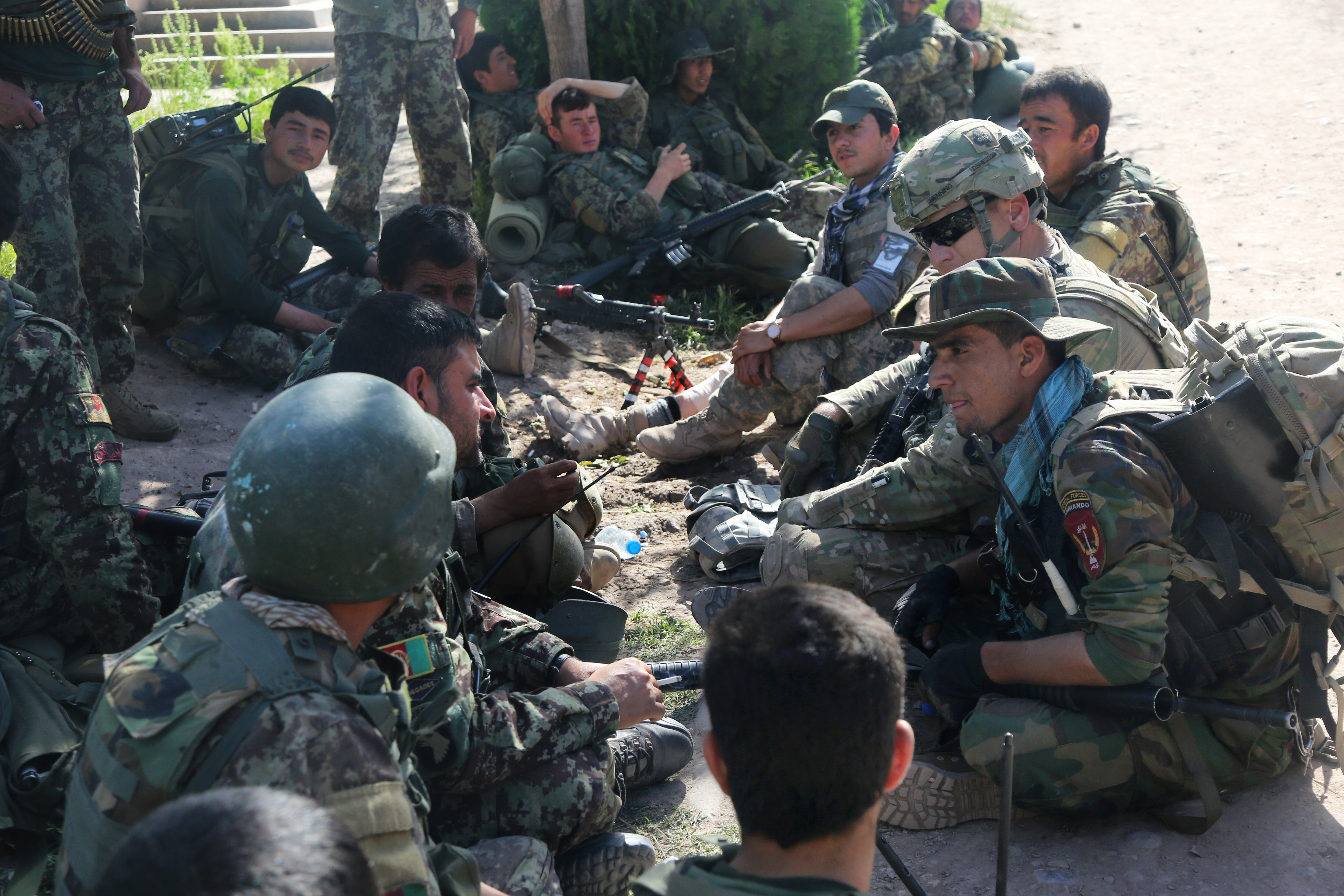U.S. and Afghan soldiers prepare to be transported back to Forward ...