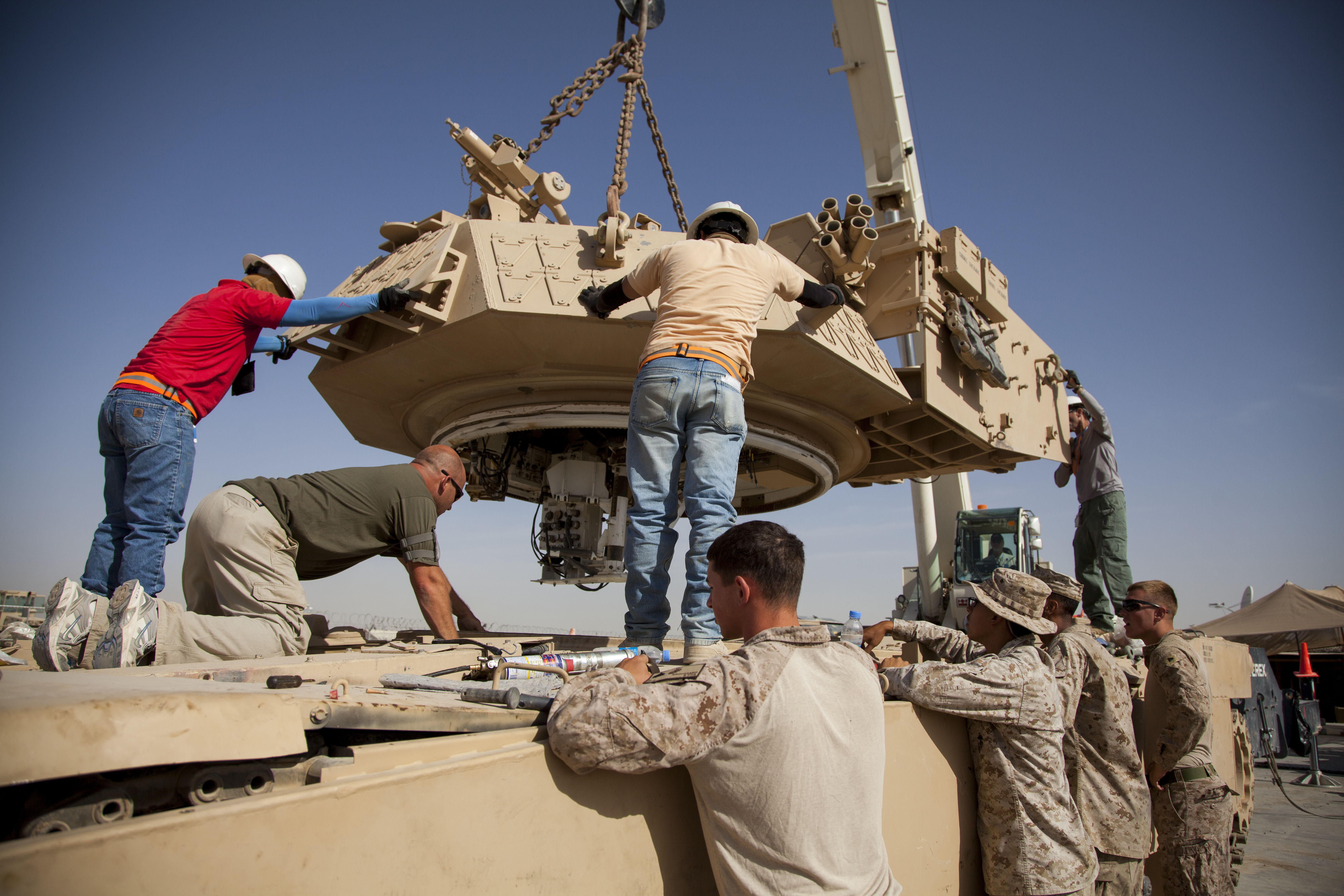 U.S. Marines direct Defense Department civilian employees while ...