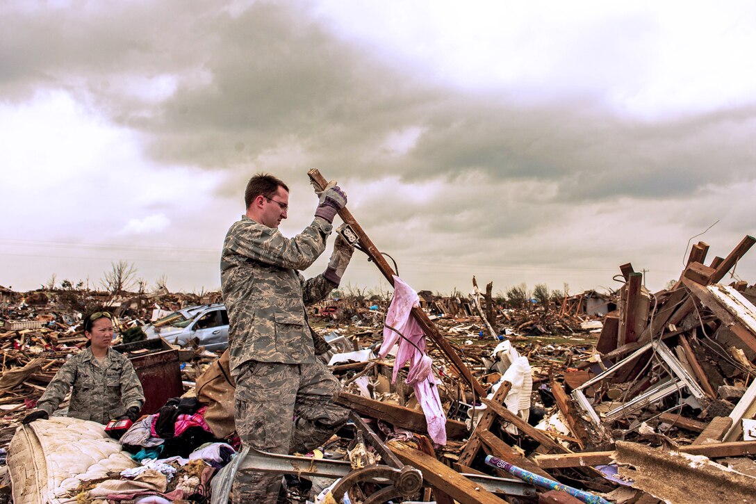 Air Force 1st Lt. Isaiah Zyduck, right, and 1st Lt. Linna De Cuir ...
