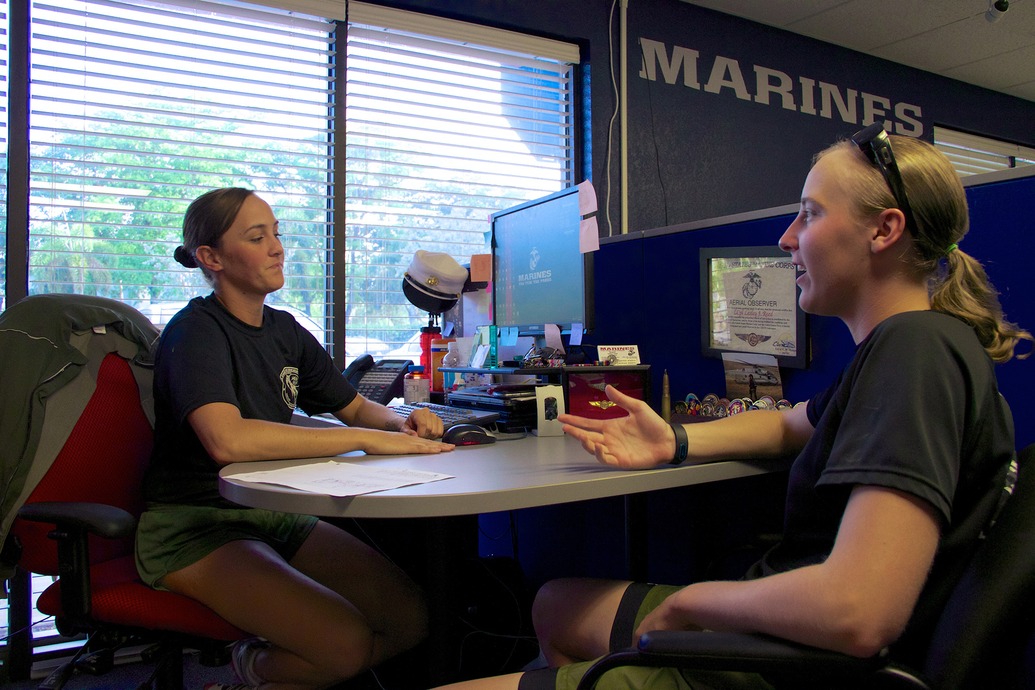 Marine Corps Sgt. Lesley Reed (left) ) shares stories from her ...