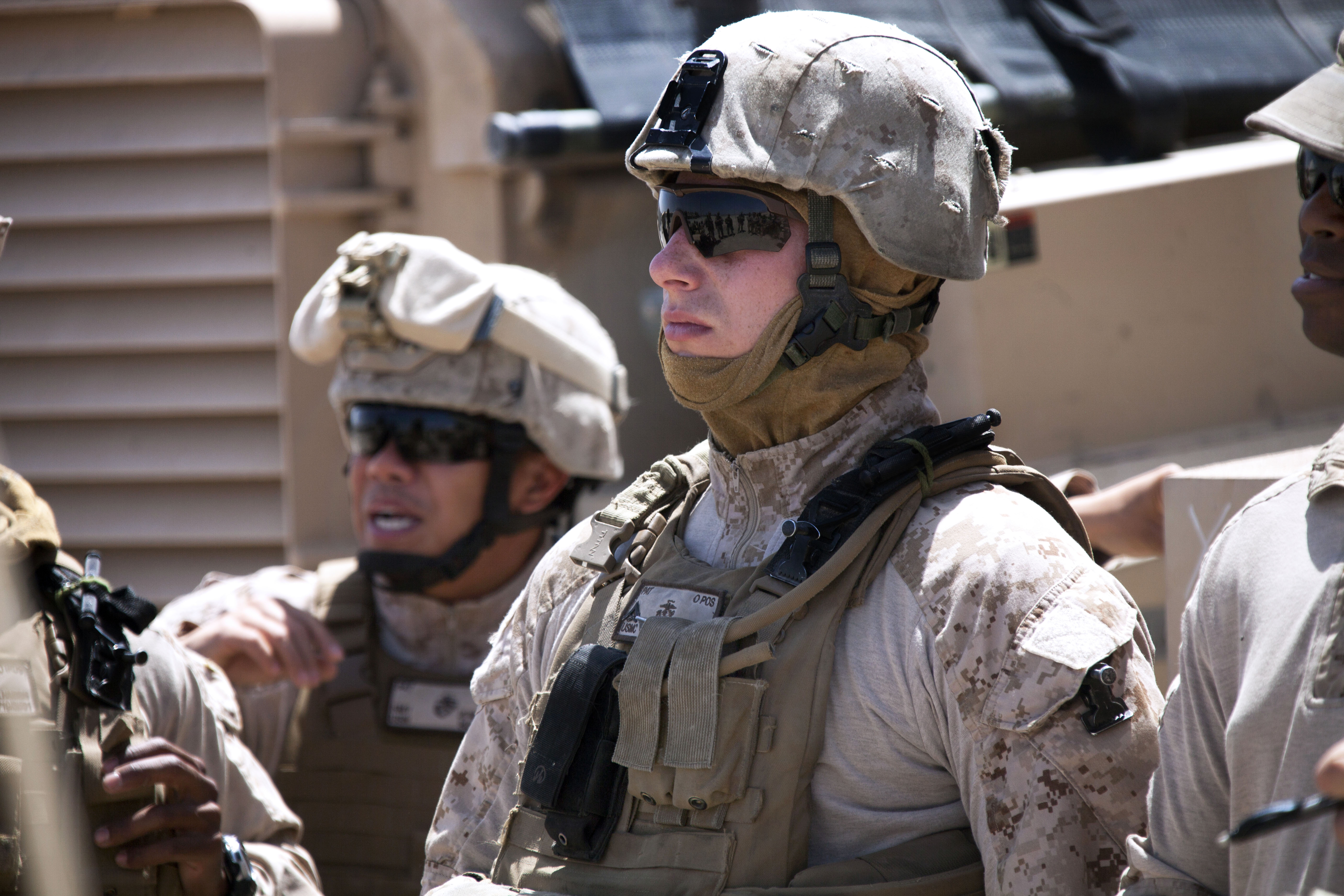 U.S. Marines listen during a mission debrief on Camp Delaram in ...