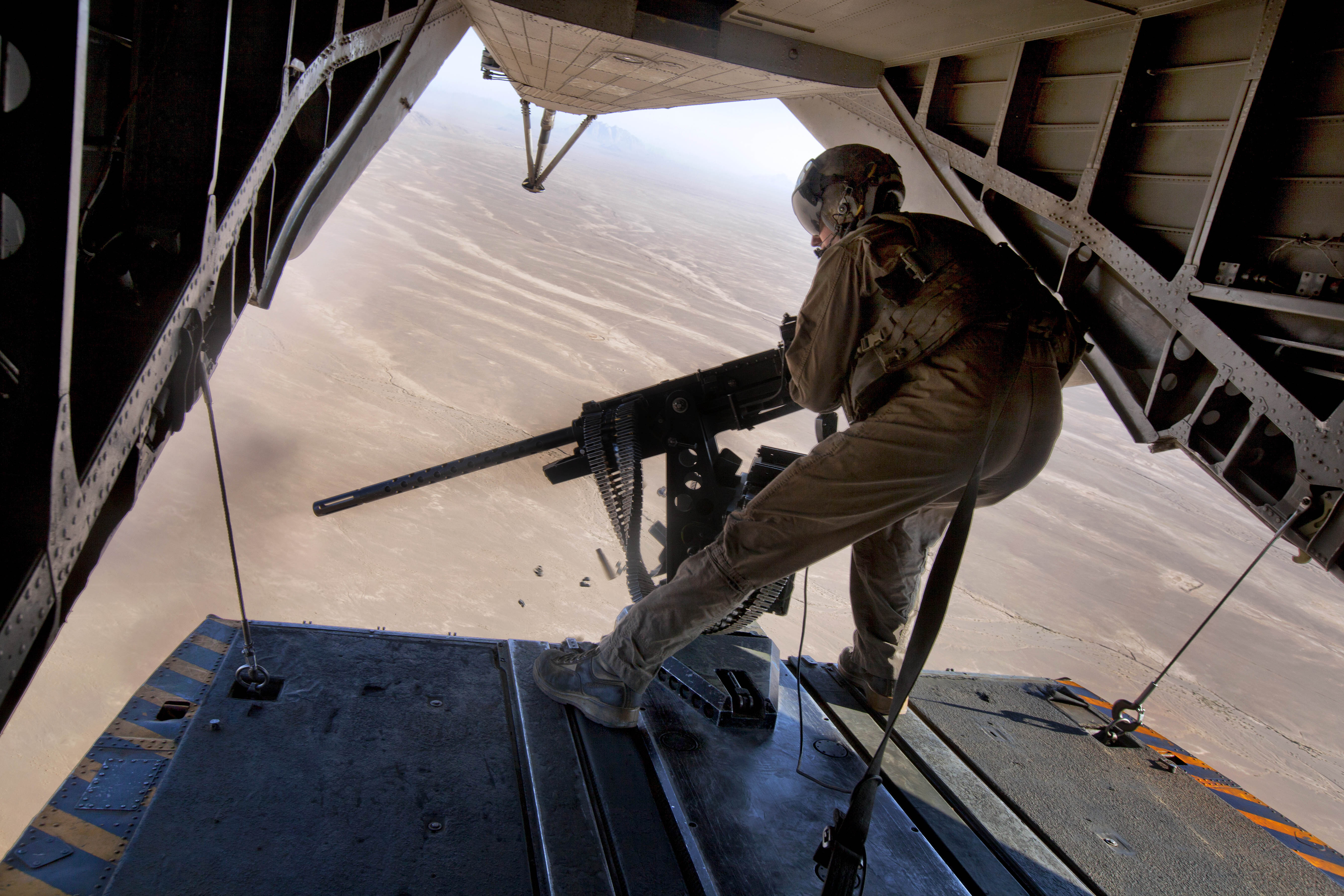 U.S. Marine Corps Cpl. Matthew D. Blanchard provides aerial security ...