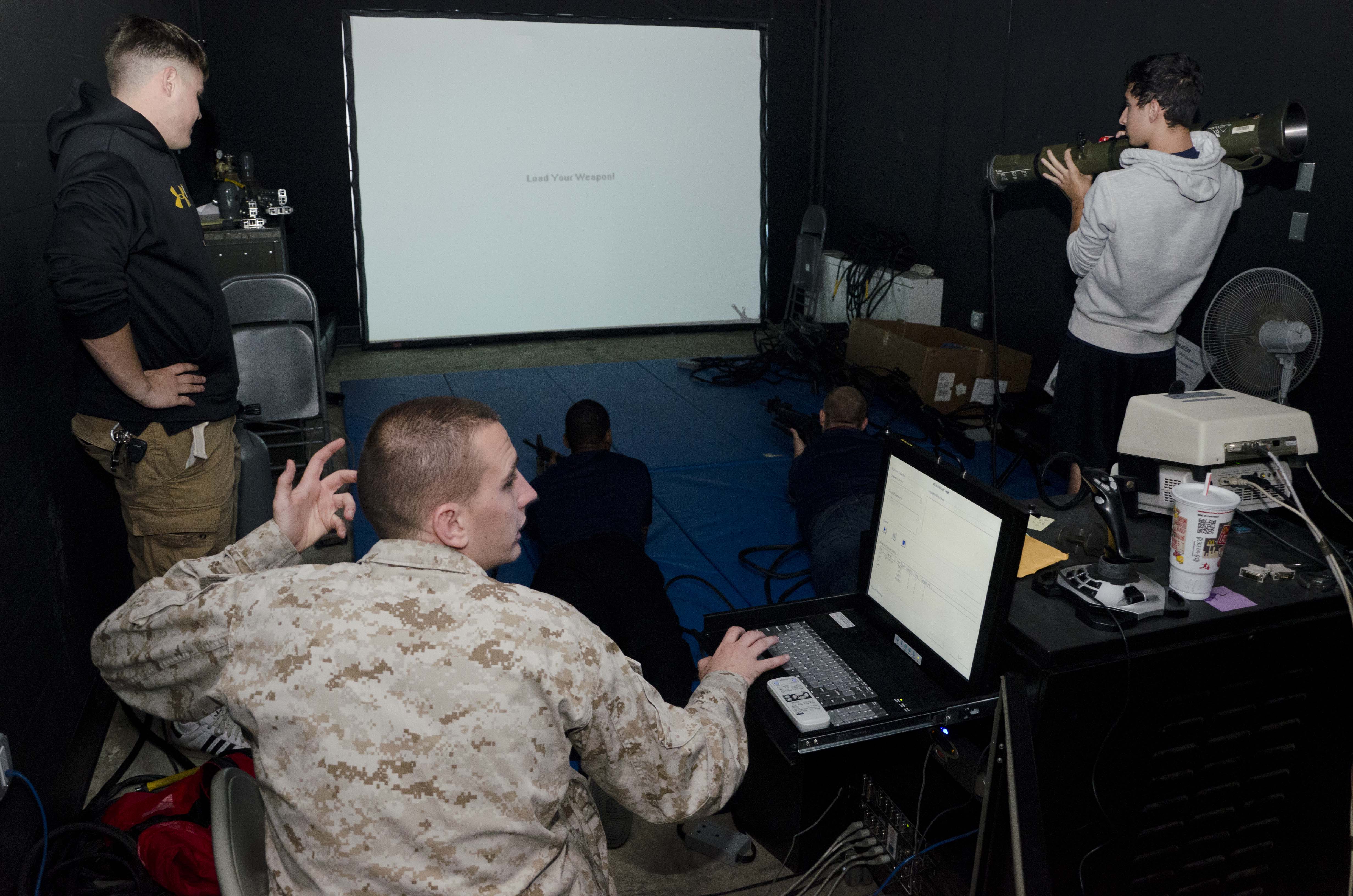 Marines show Poolees weapons handling and combat simulation