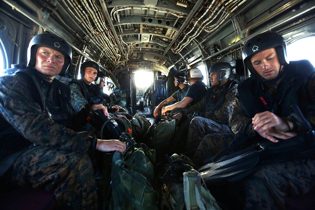 Marines and sailors prepare to demonstrate their helocasting skills ...