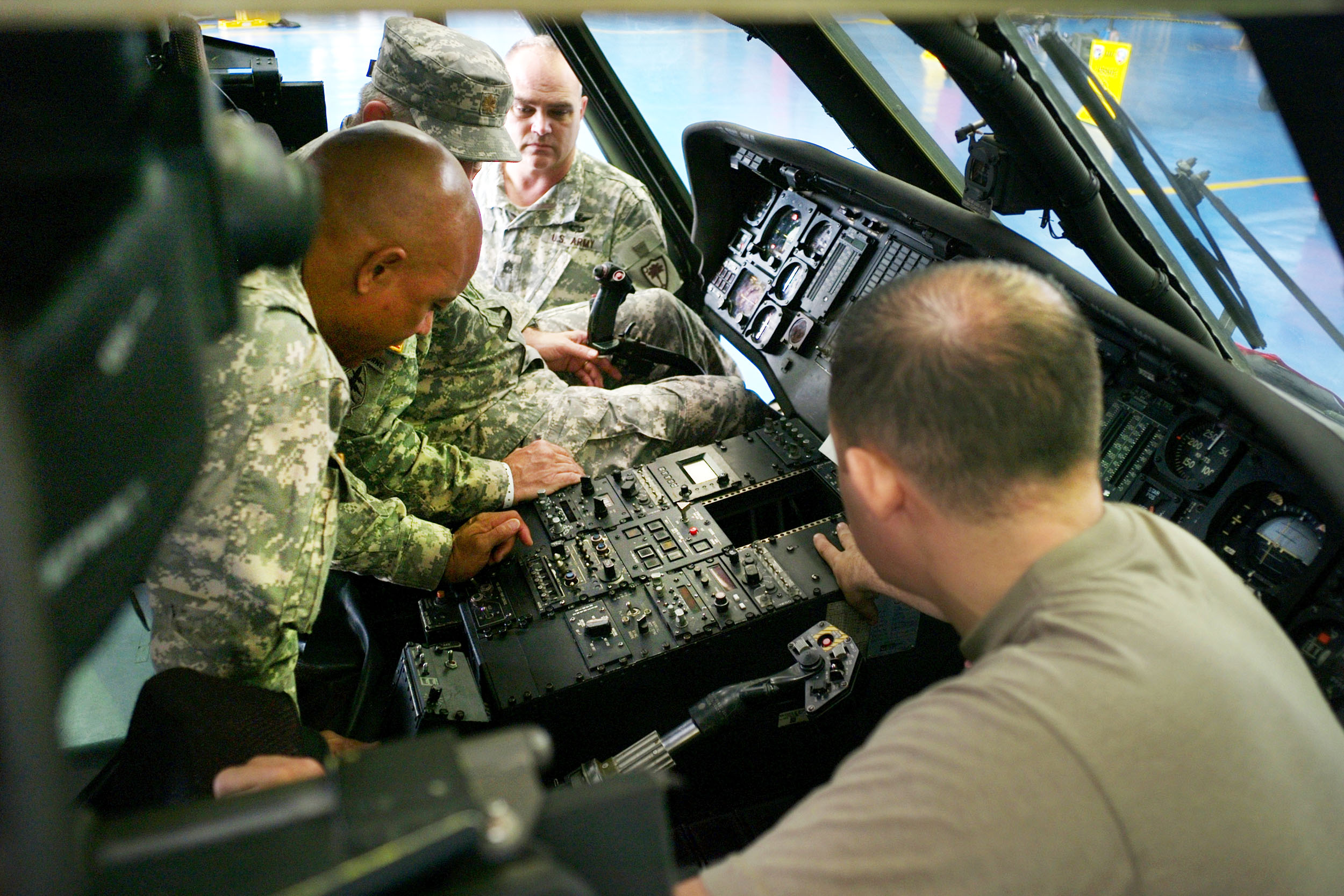 U.S. soldiers perform inspections at a maintenance and depot facility ...