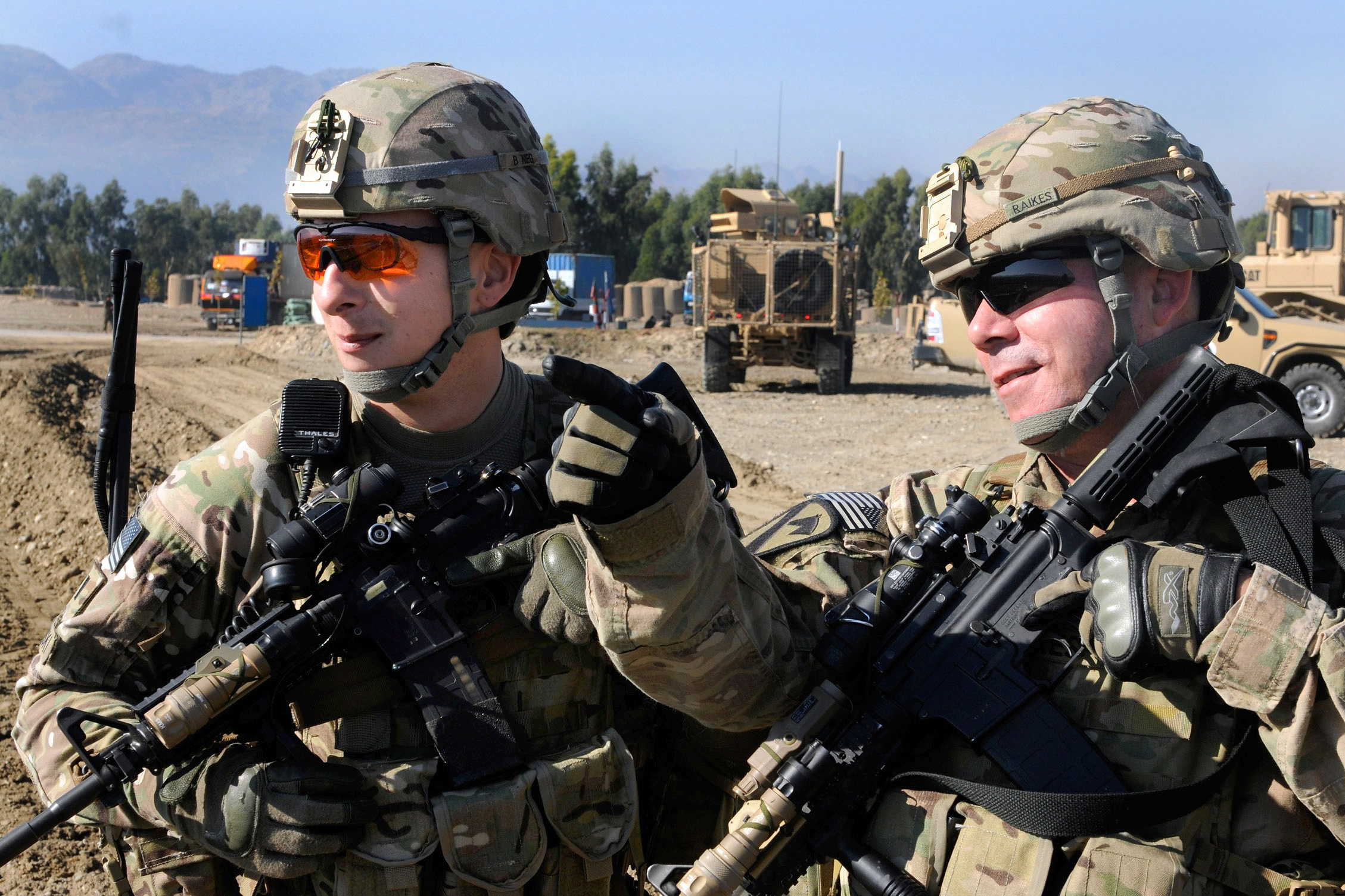 U.S. Army Capt. Russell Raikes, right, and U.S. Army 1st Lt. Justin ...