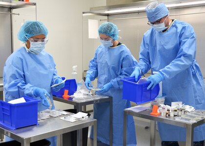Soldiers organize the material and medications