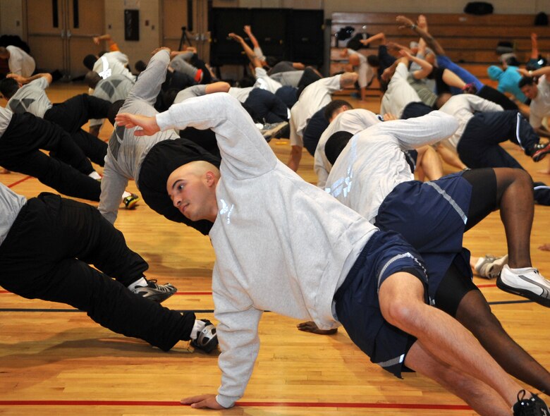 Photos: Fitness fiends pack basketball court for P90X workout > Pacific ...