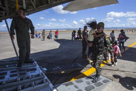 Multi-national relief aid in Tacloban during Operation Damayan