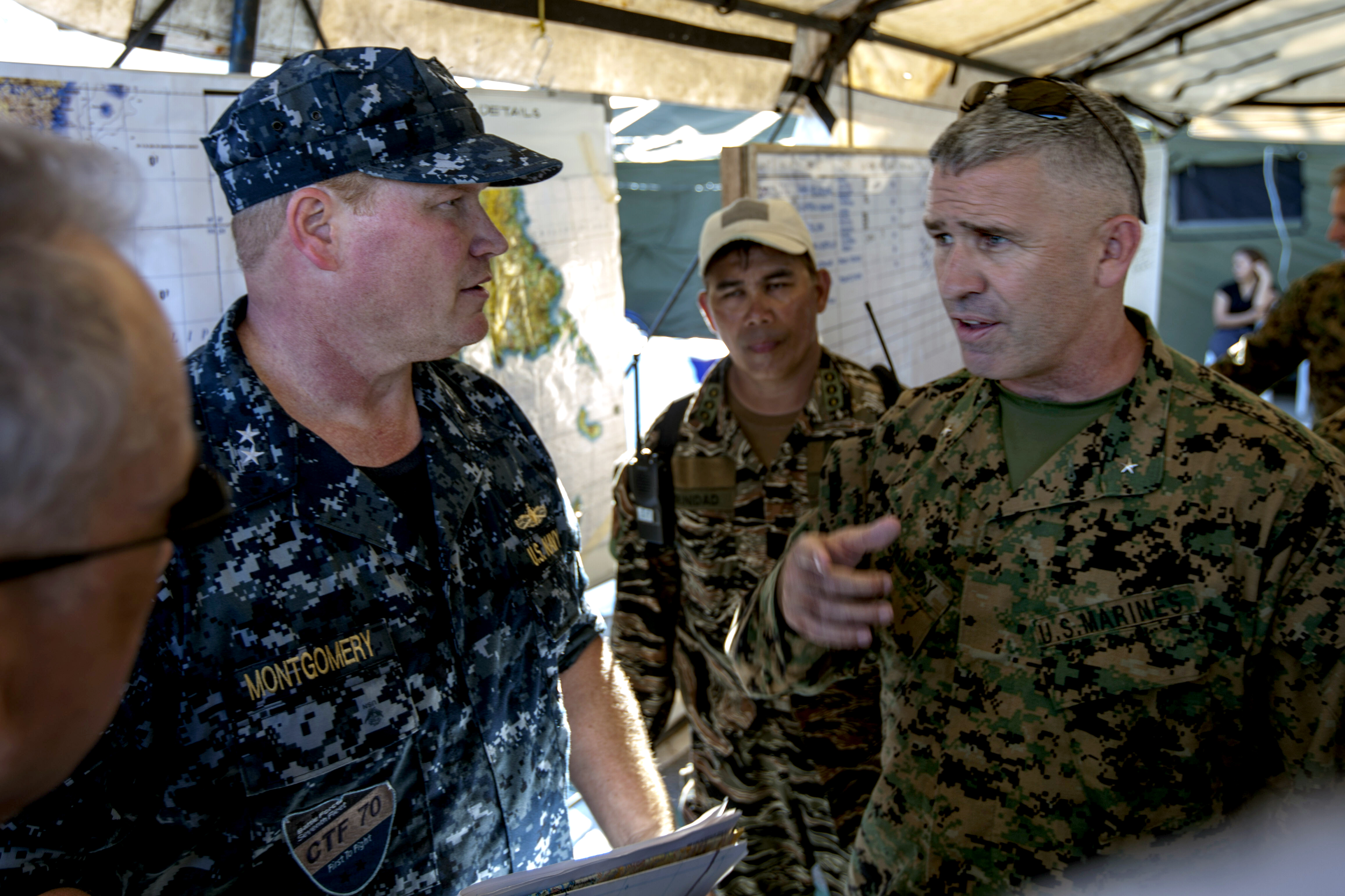 Expeditionary Brigade, speaks with U.S. Navy Rear Adm. Mark C ...