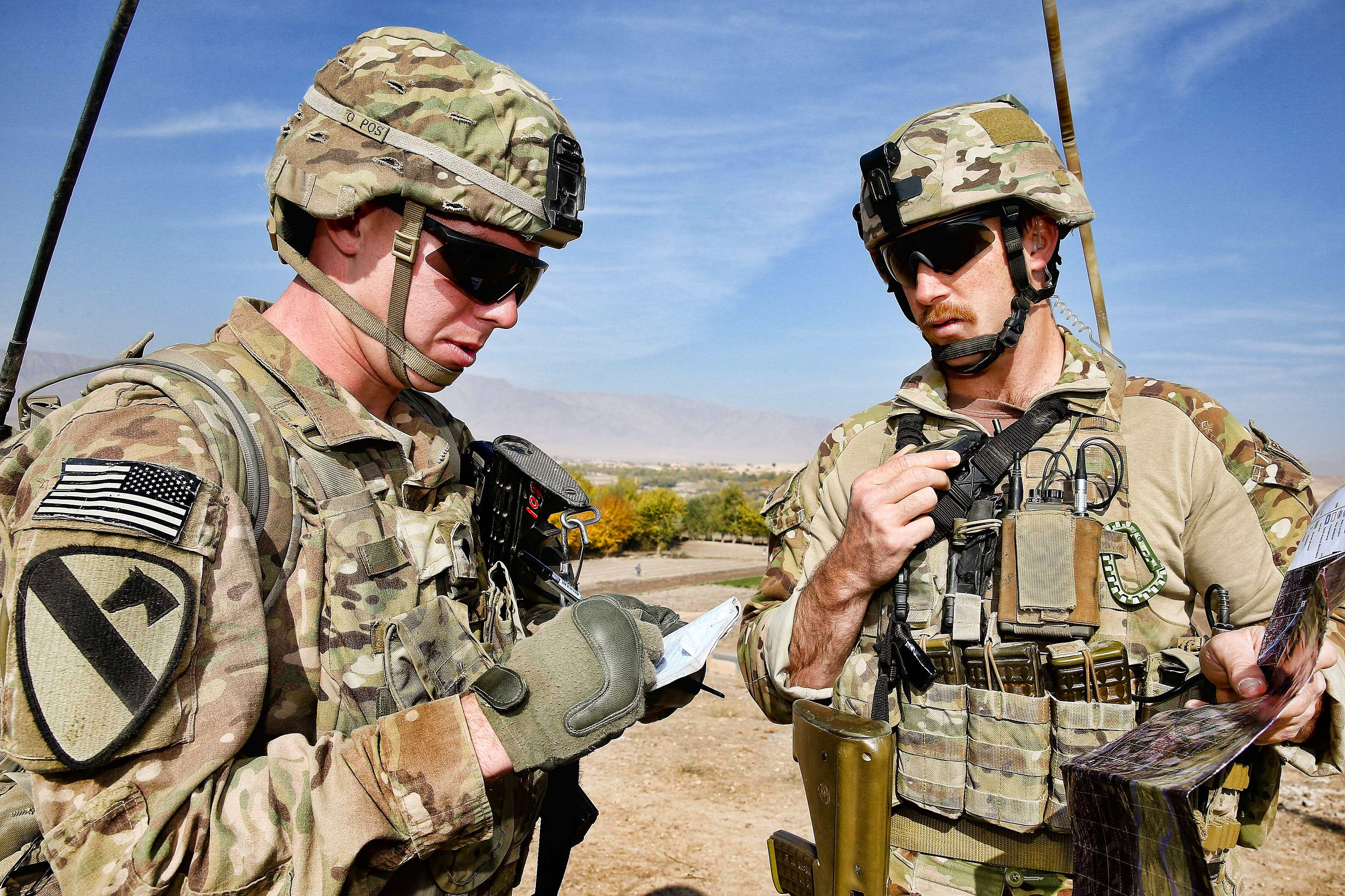 U.S. Army Spc. Sean M. Barrick, left, and Royal Australian Air Force ...