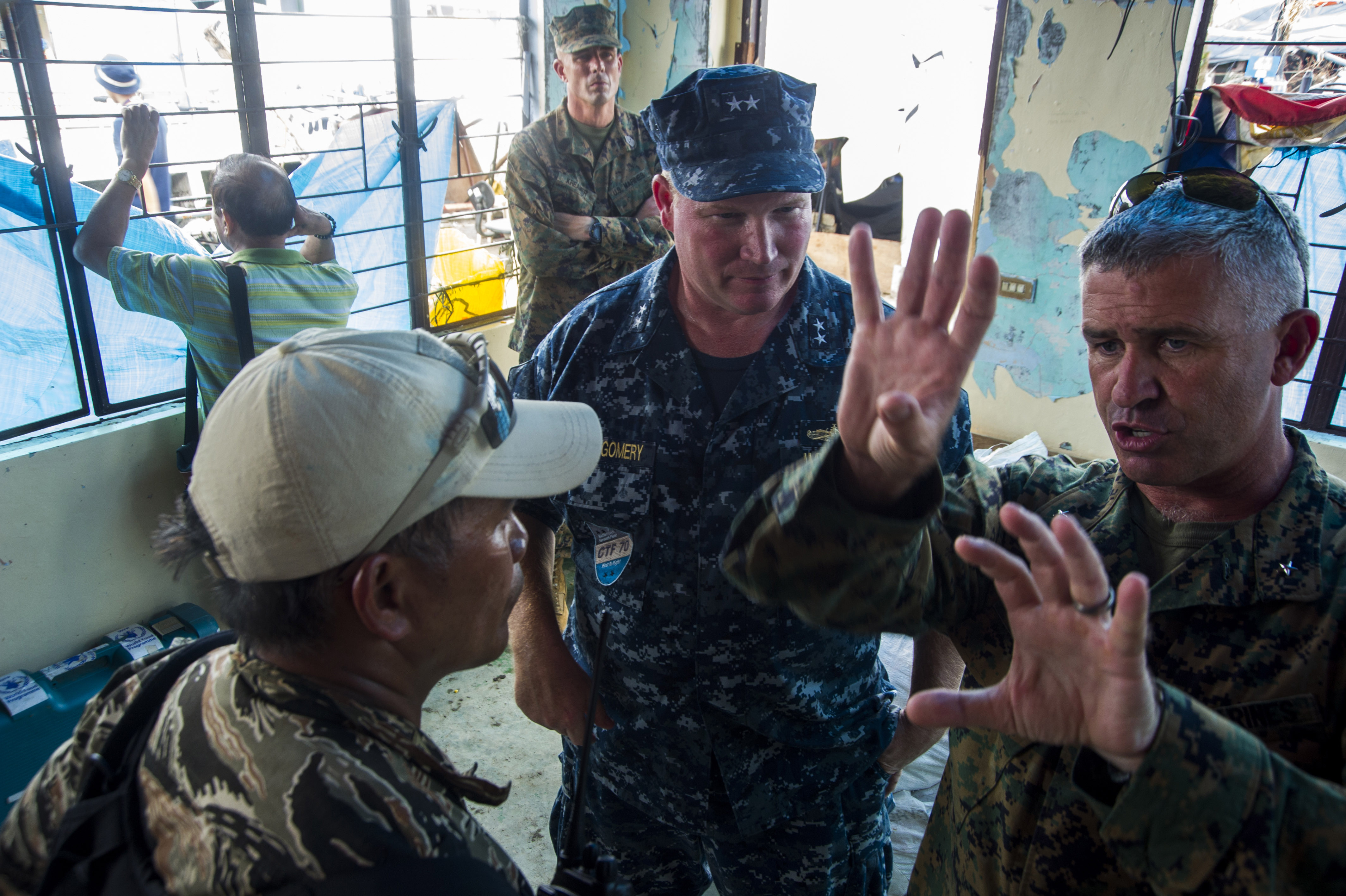 U.S. Marine Corps Brig. Gen. Paul Kennedy, right, commanding general of ...