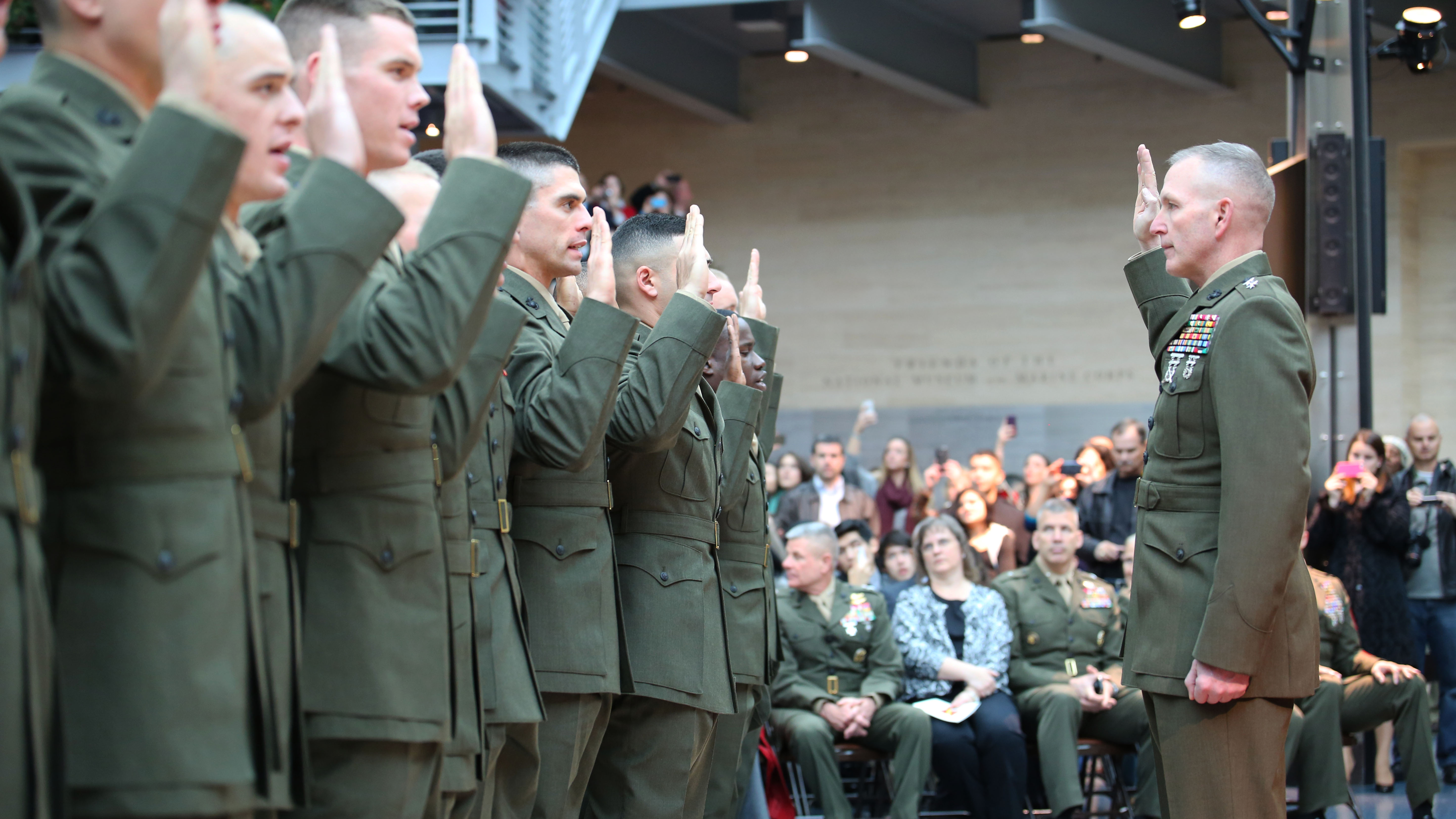 MCRC commanding general recites Oath of Office for graduating officers.