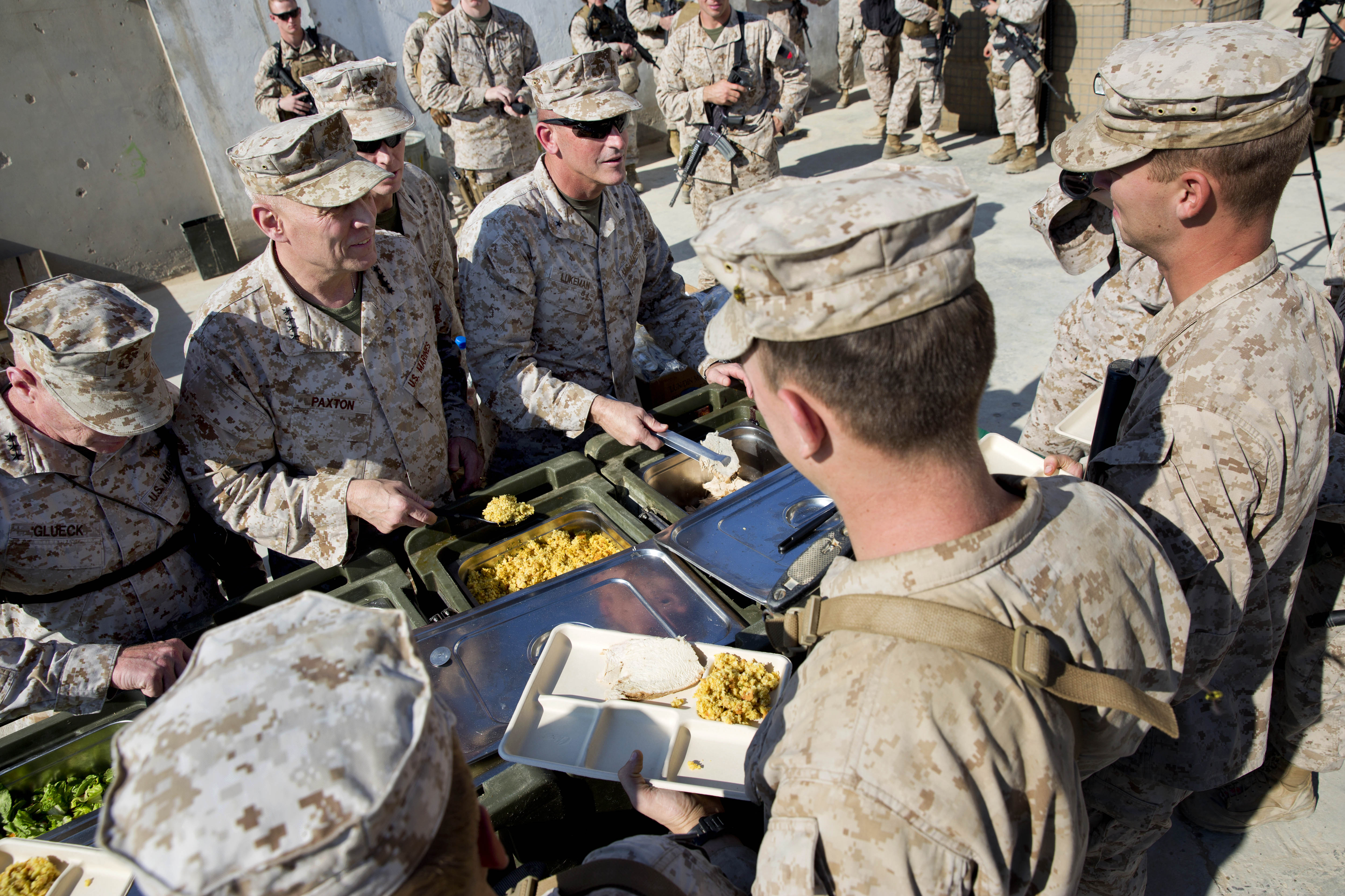 U.S. Marine Corps Gen. John M. Paxton, center, assistant commandant of ...