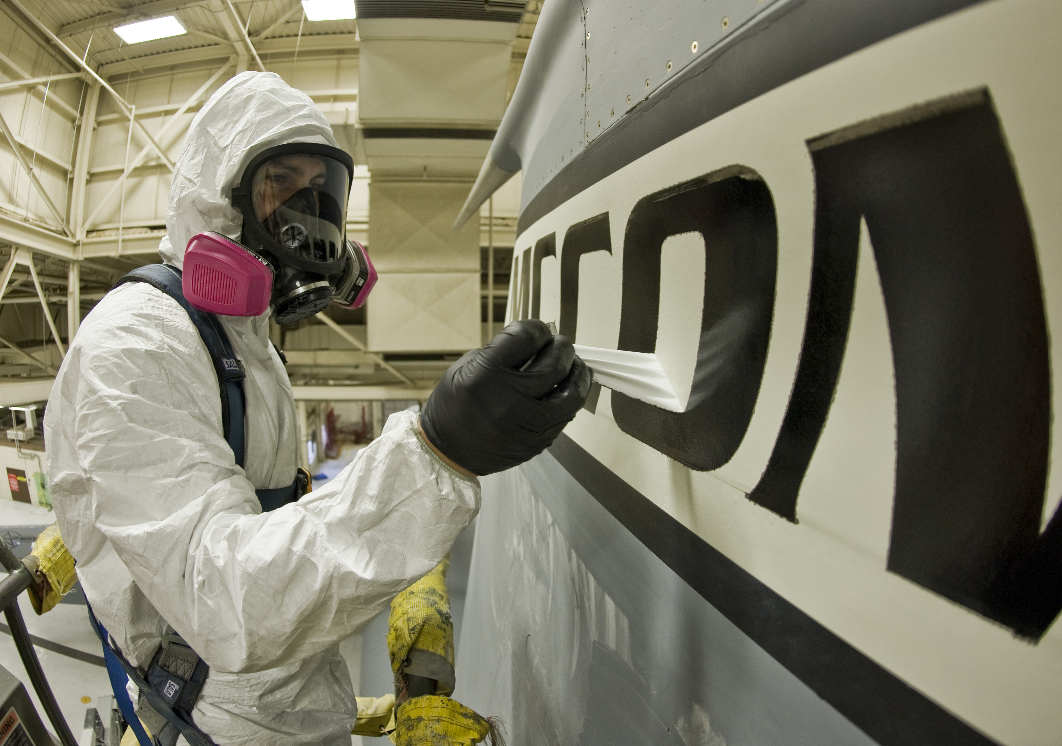 Maintenance Airman 'tags' tanker