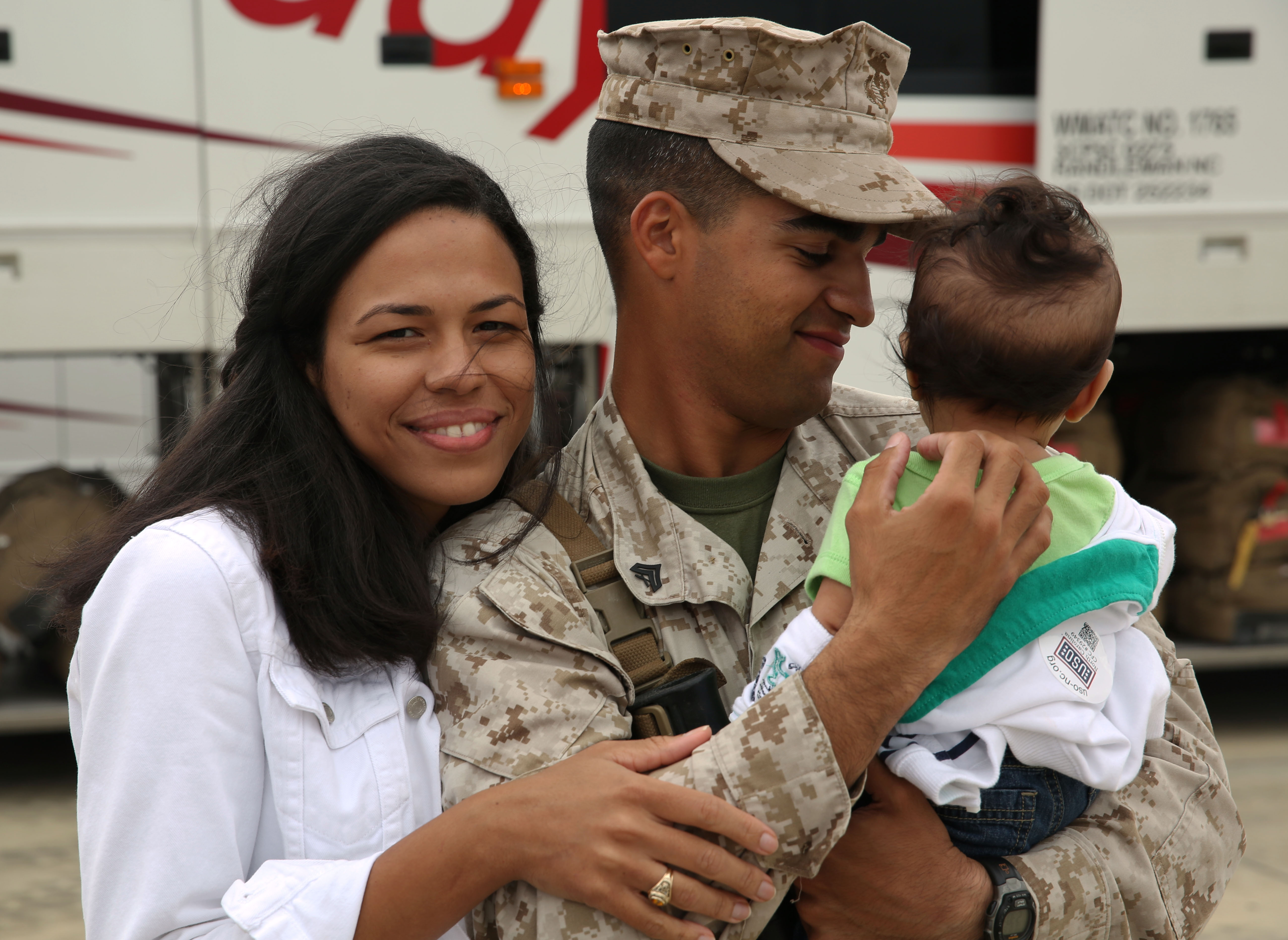 Marines embrace their friends and families after a long deployment
