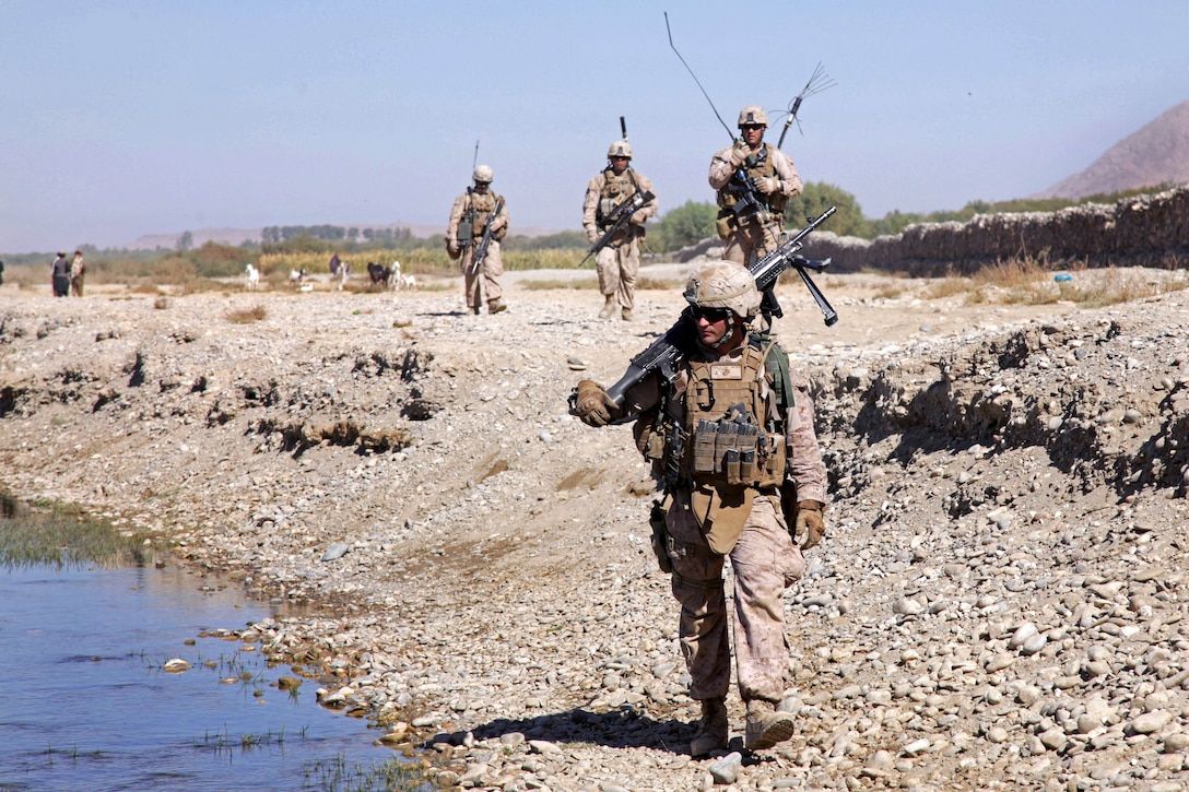 U.S. Marines patrol near Forward Operating Base Musa Qala in ...