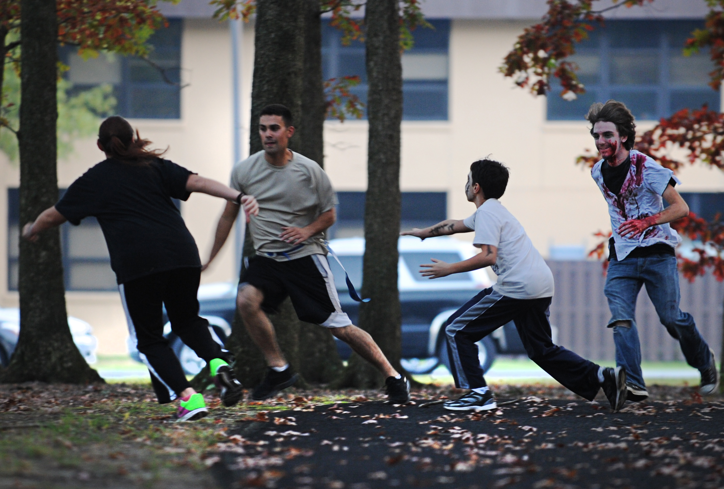 People Running From Zombies